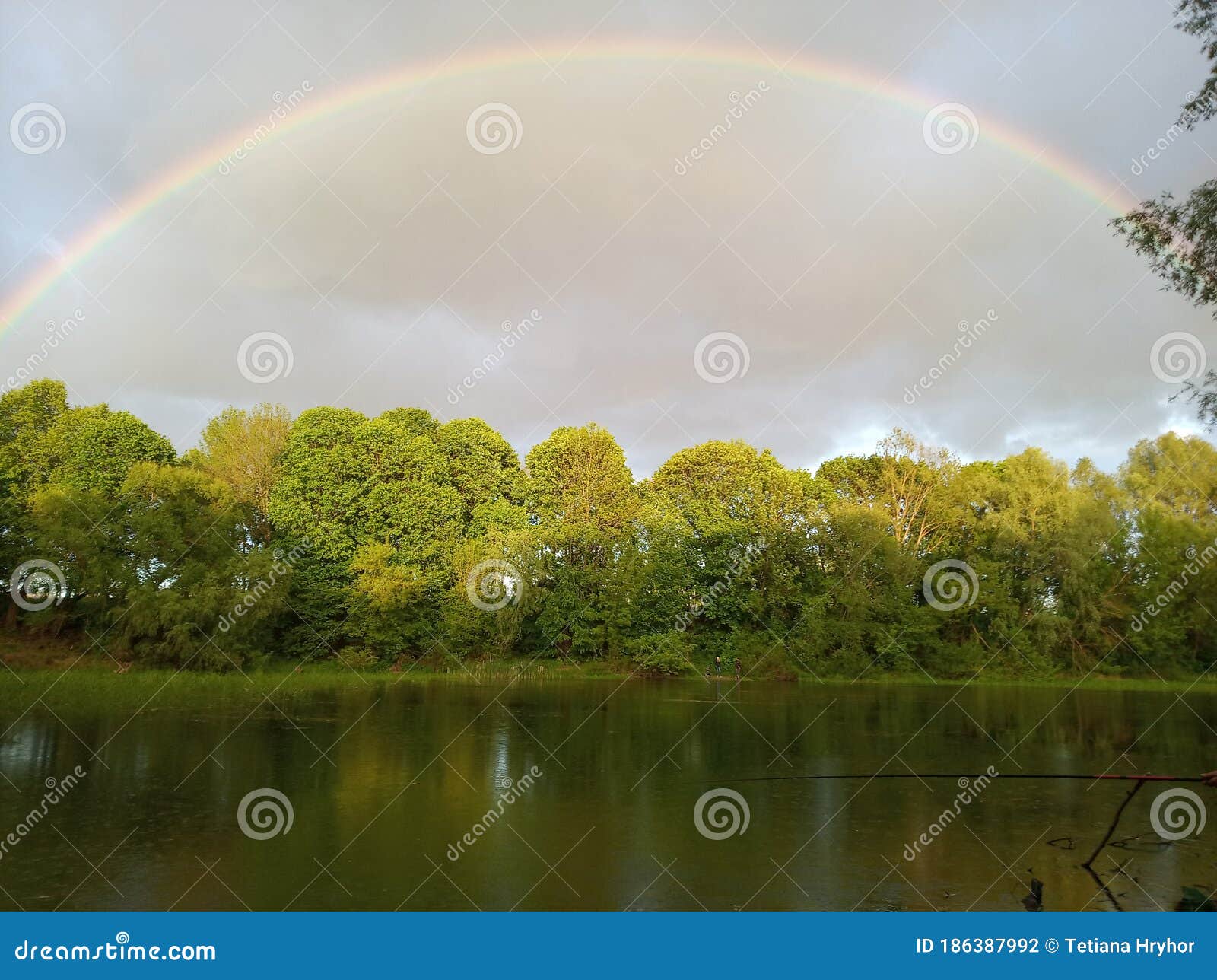 Rainbow Over the Lake in the Evening Stock Photo - Image of morning ...