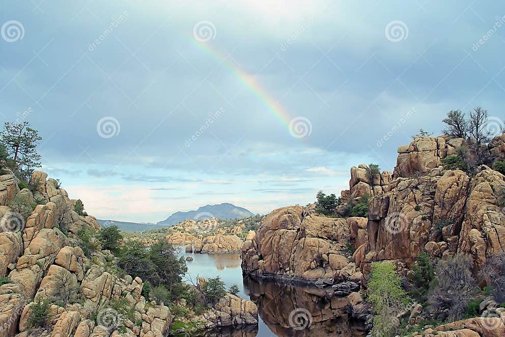 Rainbow over Lake Watson stock photo. Image of overcast - 983190