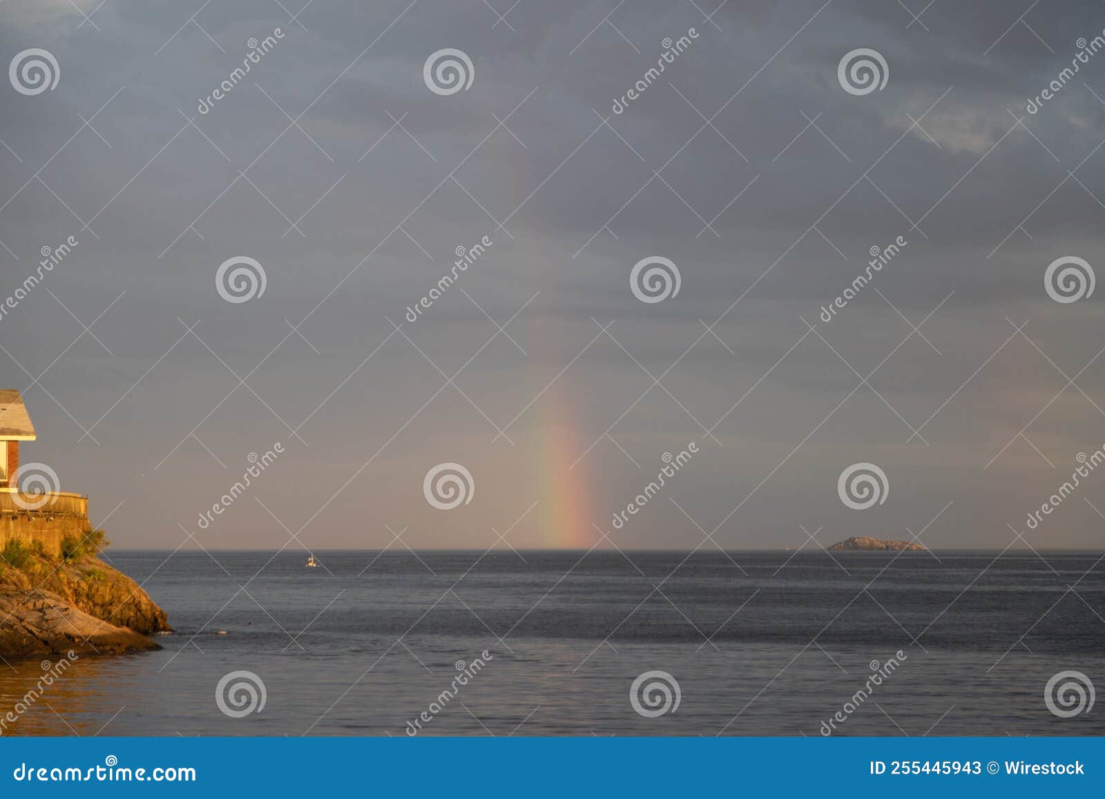 Rainbow Over Ocean at Sunset Stock Image - Image of coast, stormy ...