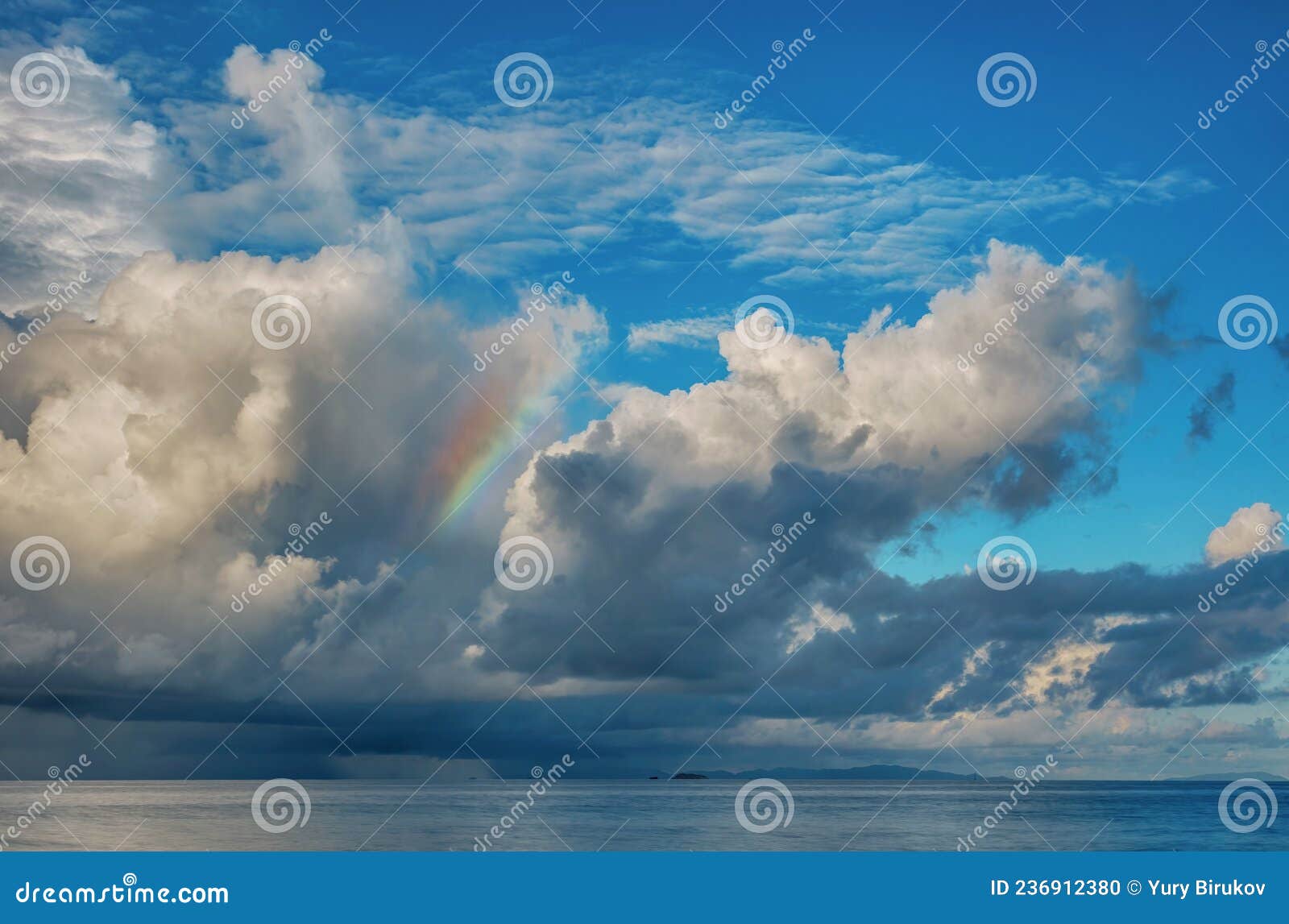 Rainbow Over the Ocean and Tropical Island Stock Photo - Image of ...