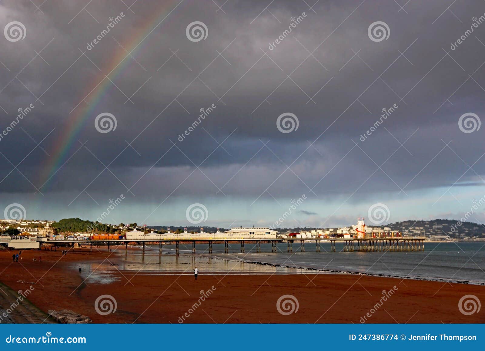 Rainbow Over Paignton Pier in Torbay, Devon Editorial Stock Image ...