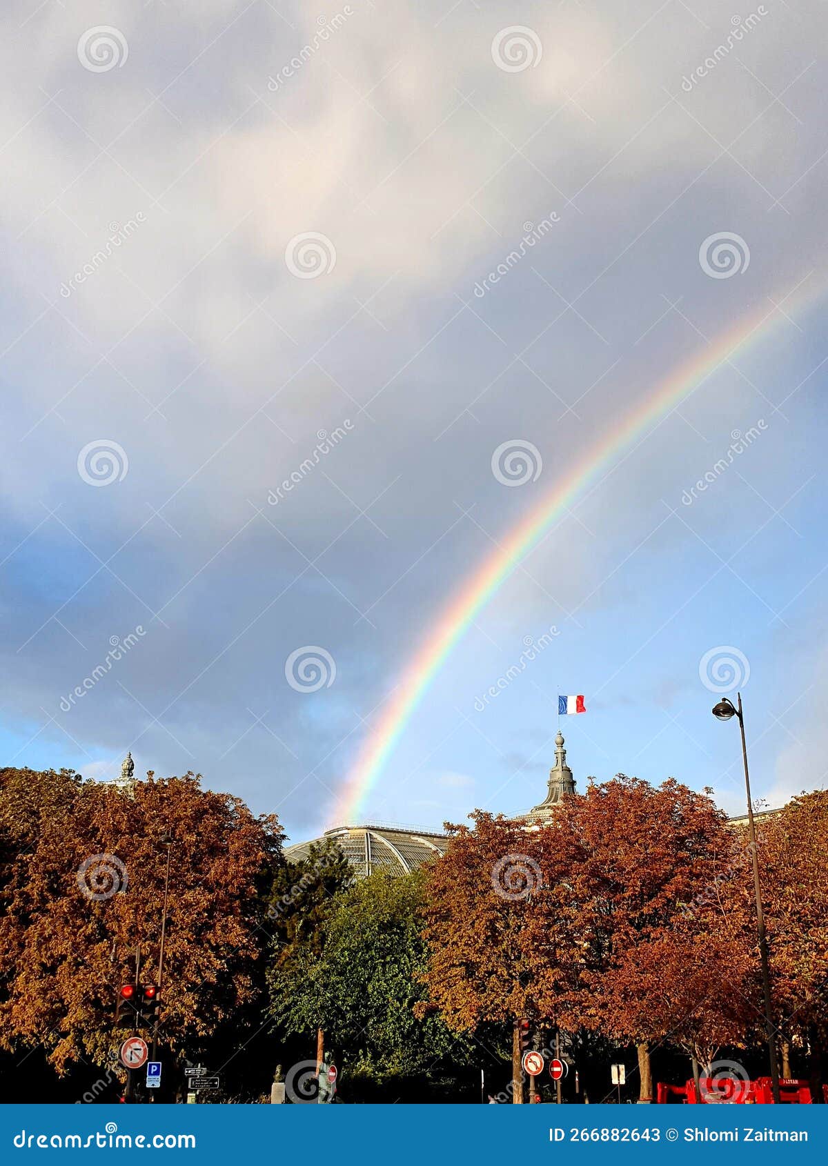 Rainbow over Paris stock image. Image of sunlight, landscape - 266882643