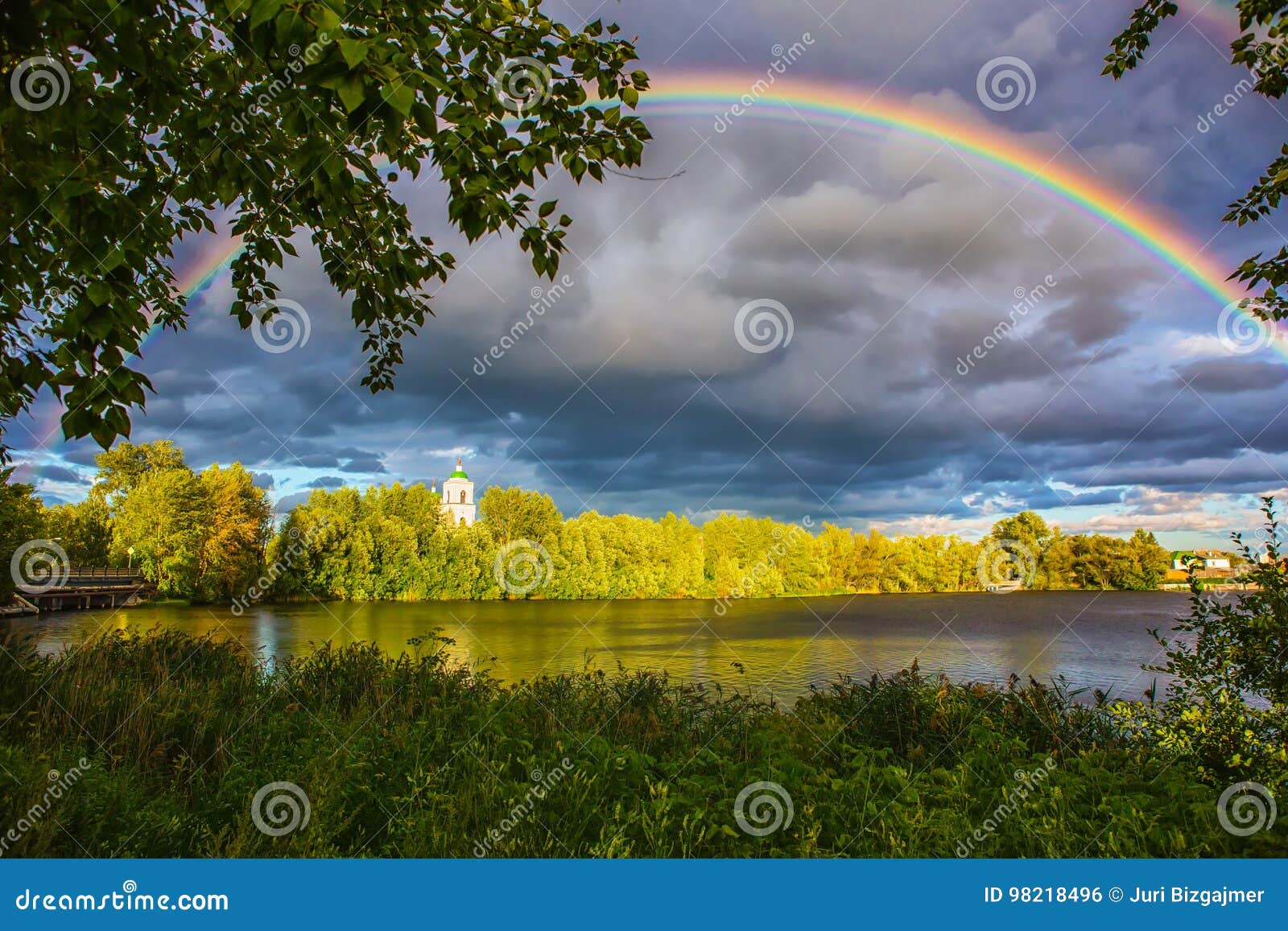 Rainbow over the river stock photo. Image of tourism - 98218496