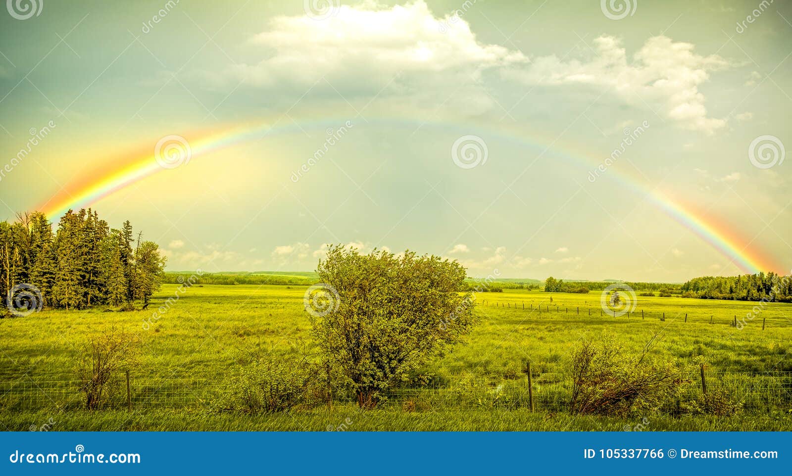Rainbow Over a Rural Countryside Scene Stock Photo - Image of clouds ...