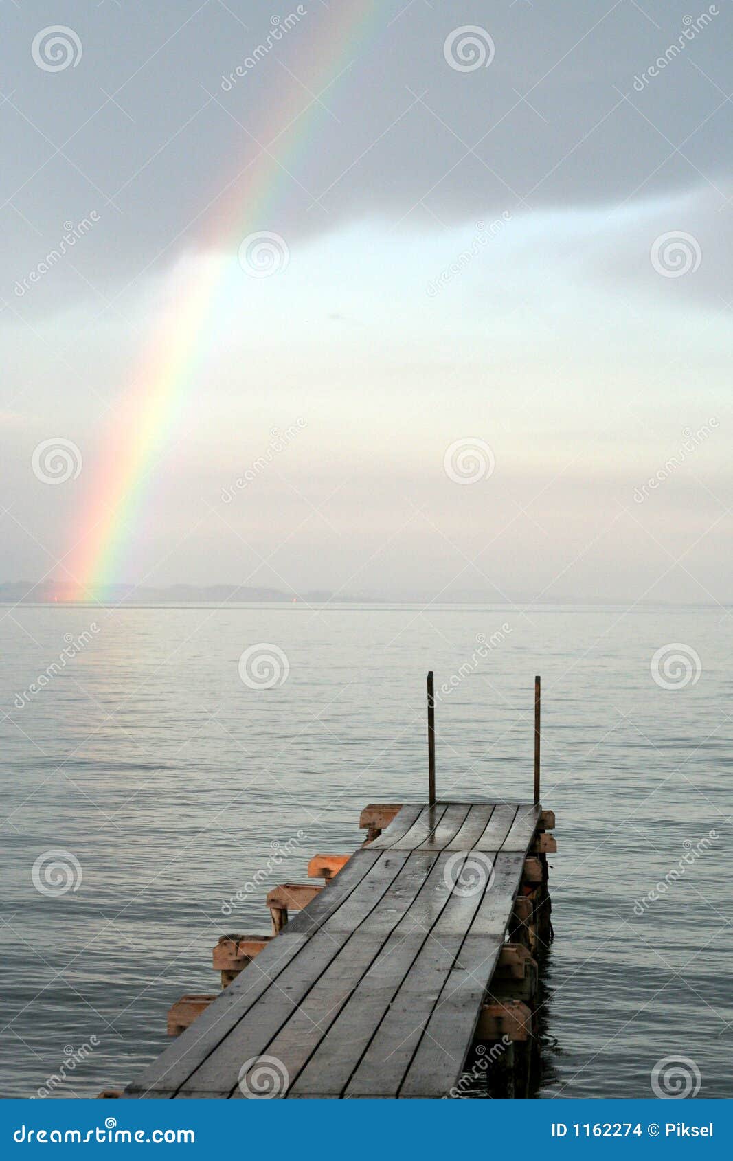 Rainbow over the sea stock photo. Image of denmark, coastal - 1162274