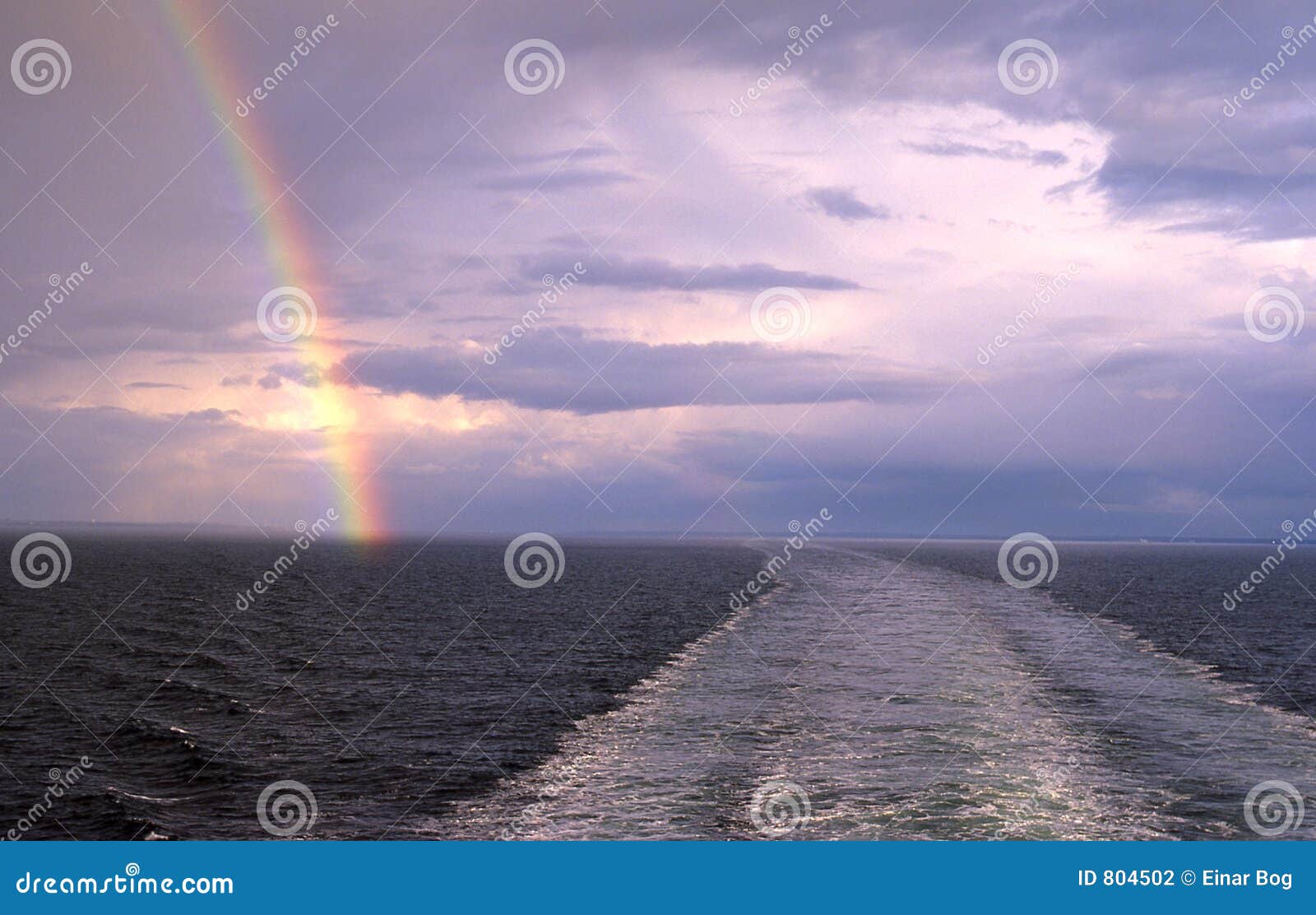 Rainbow over sea stock photo. Image of beautiful, water - 804502