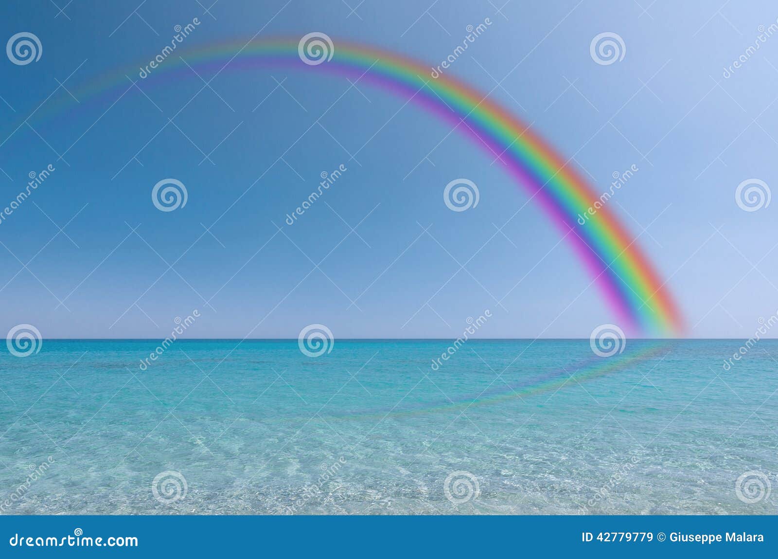 Rainbow over the sea stock image. Image of colors, harmony - 42779779