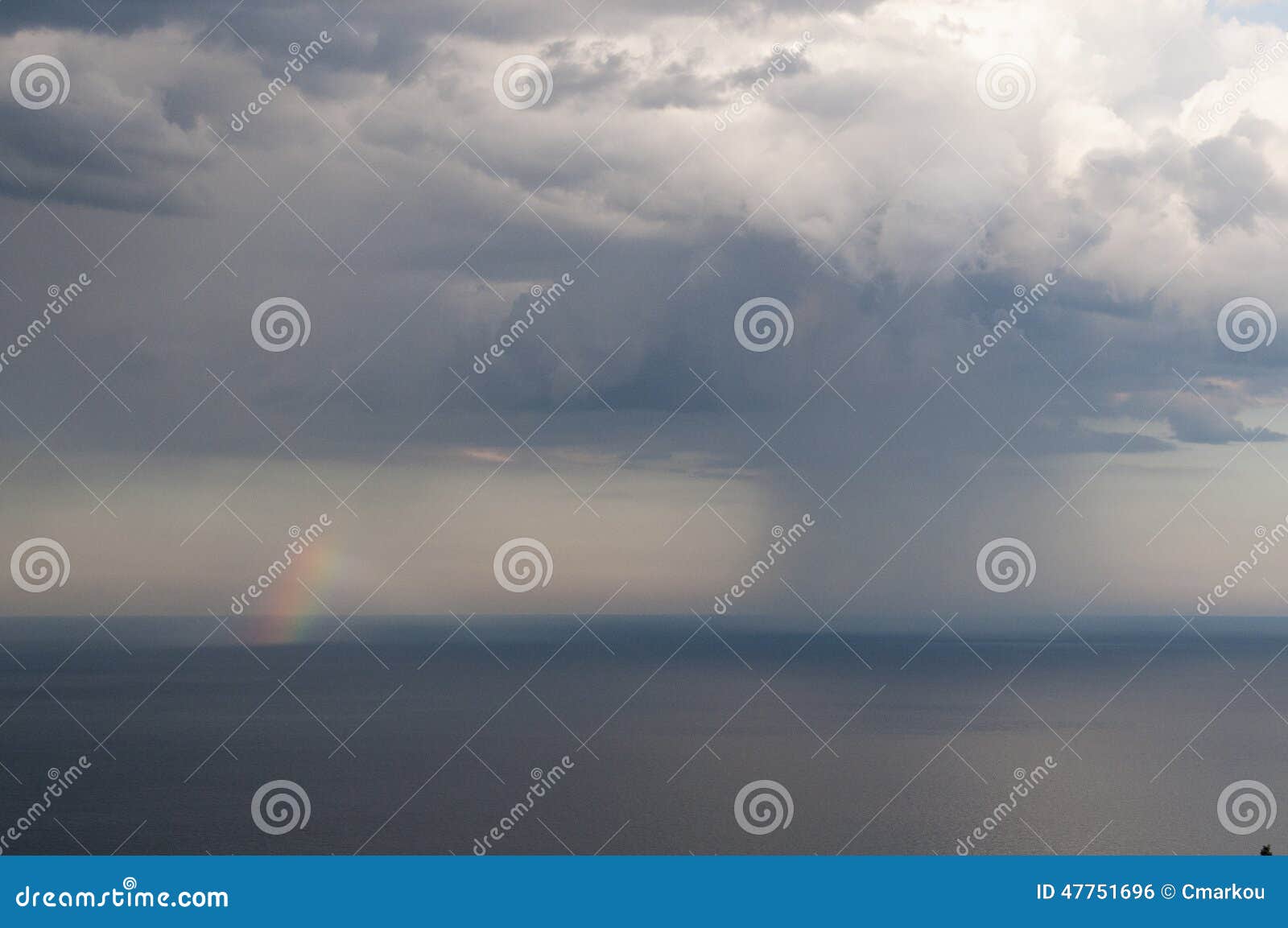 Rainbow over sea water stock photo. Image of rain, cumulus - 47751696