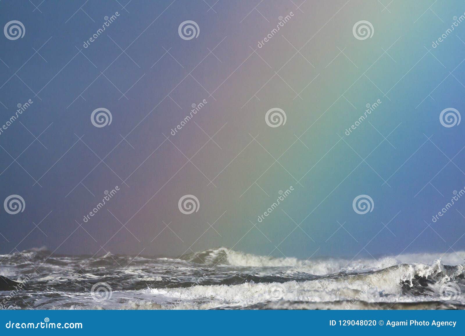 Rainbow over sea stock photo. Image of grafisch, netherlands - 129048020