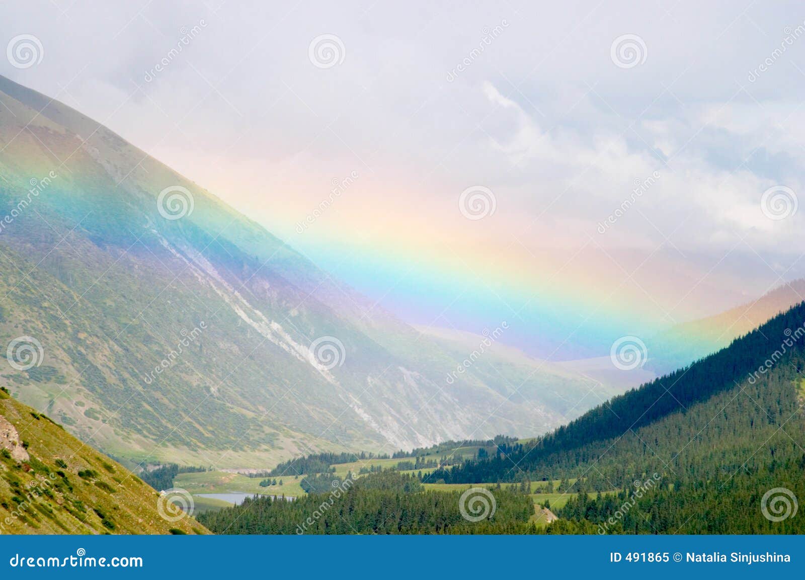 Rainbow over the valley stock image. Image of chon, valley - 491865
