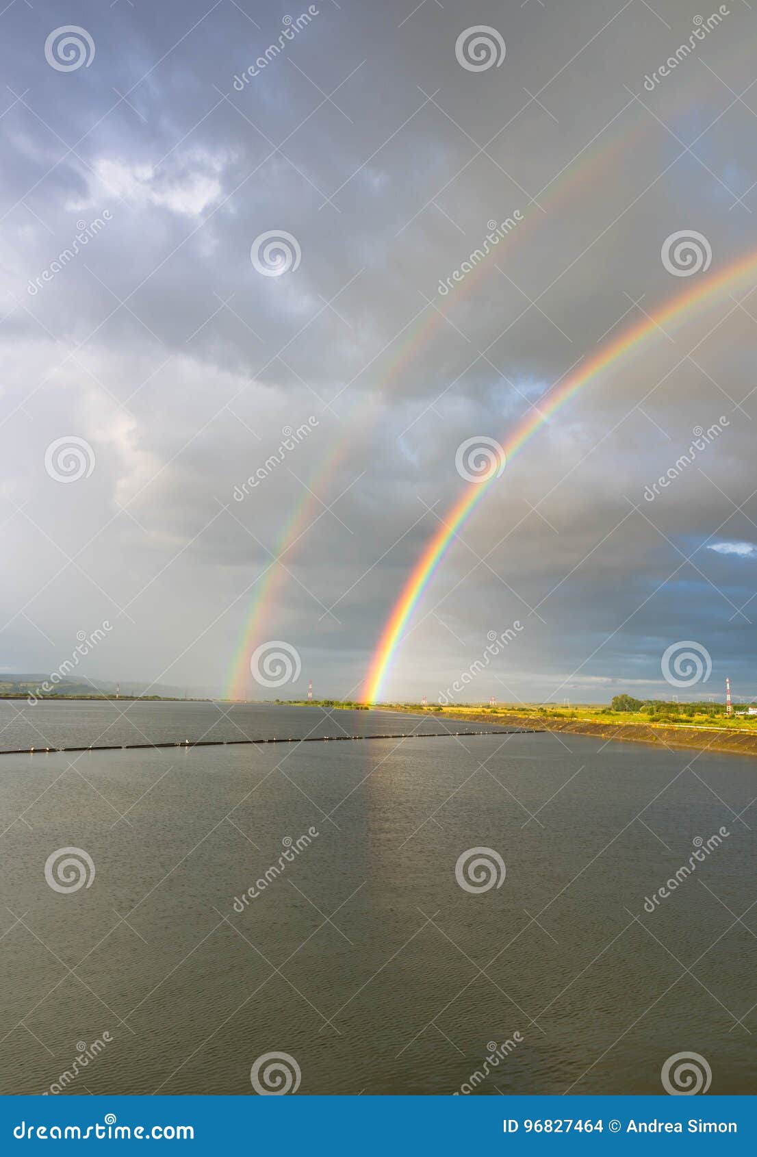 Rainbow over water stock photo. Image of blue, clear - 96827464