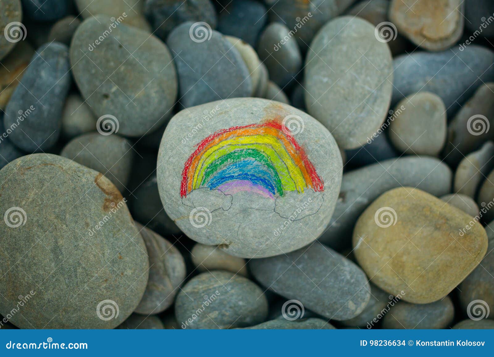 Rainbow painted on stone stock photo. Image of colorful - 98236634