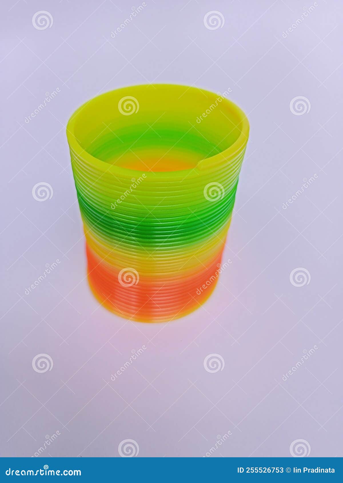 Rainbow Plastic Coil Spring Toy on White Background Editorial Stock ...