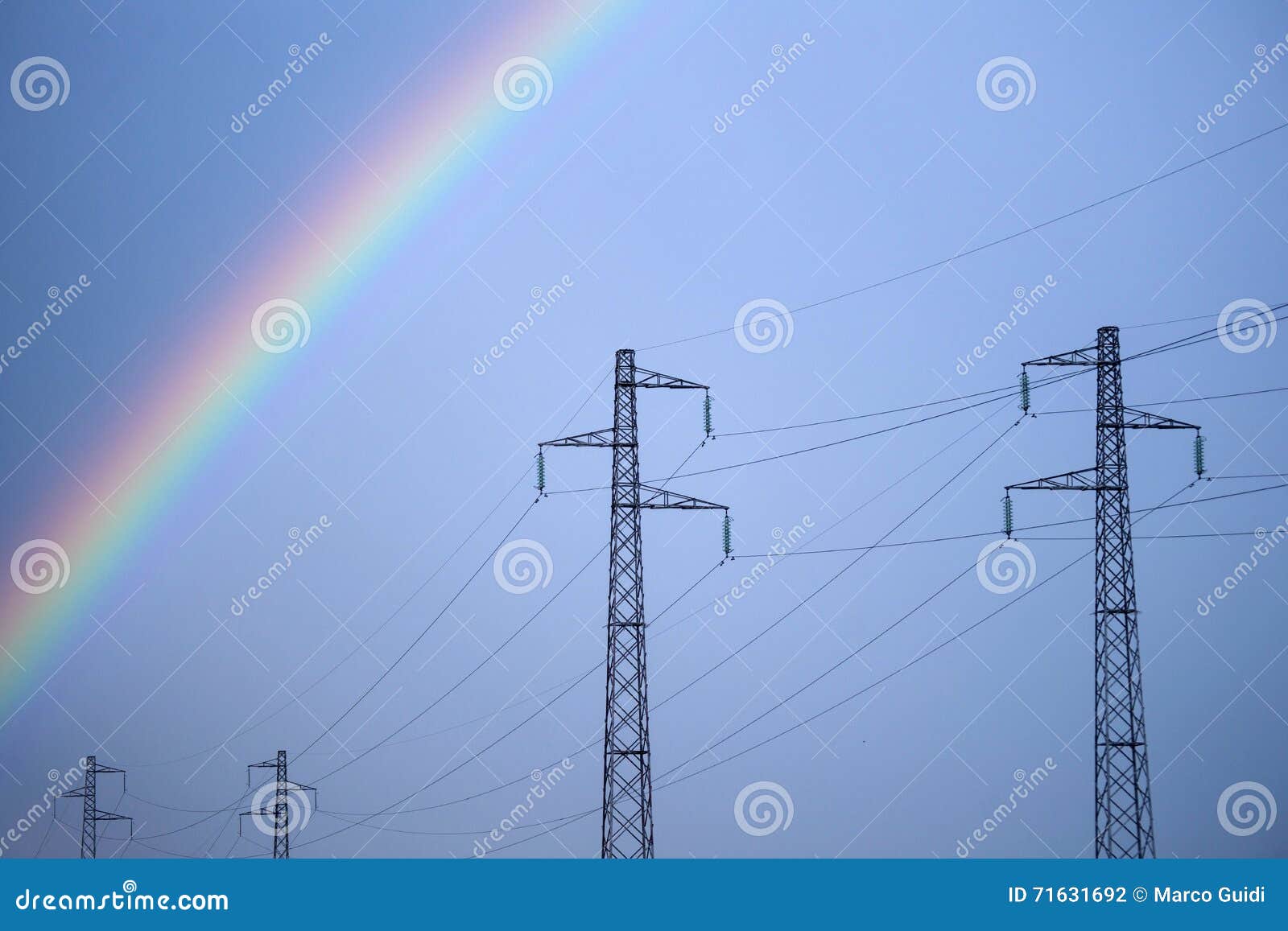 Rainbow through power line stock photo. Image of line - 71631692