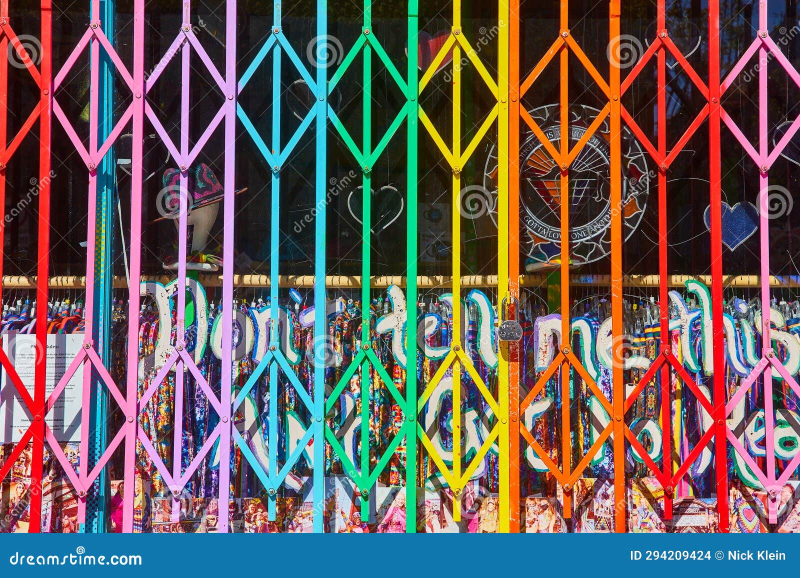 Rainbow Pride Colored Vibrant Metal Beams of Gate with Padlock Stock ...