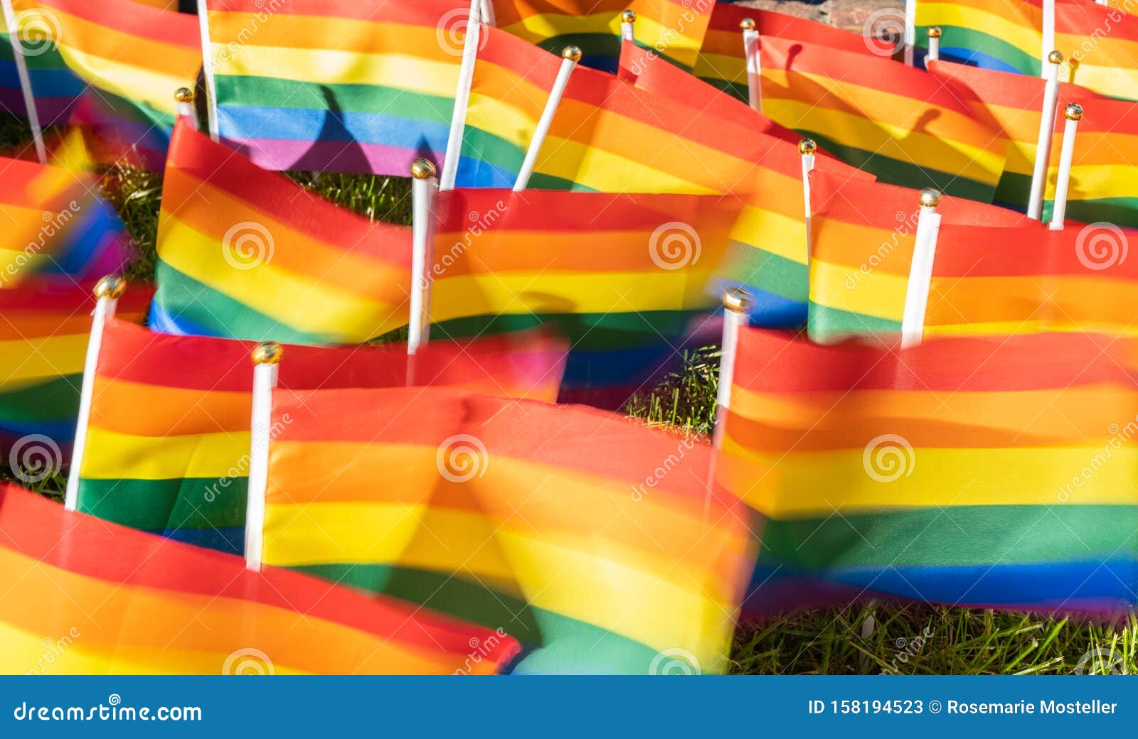 Rainbow Pride Flags Blowing in the Wind Blurred by Long Exposure Stock ...