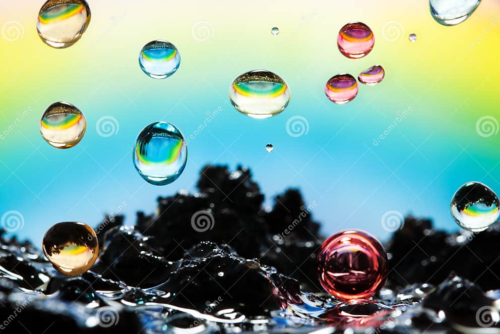 Rainbow rain stock photo. Image of drops, macro, puddles - 16807276