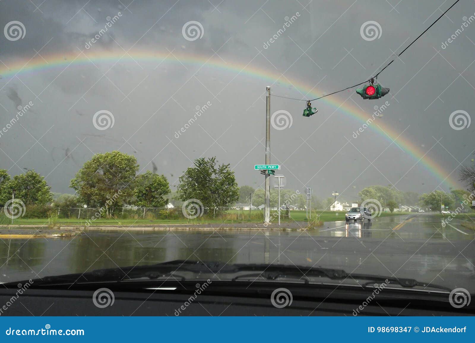 Rainbow in a Rainstorm stock image. Image of summer, rainbow - 98698347