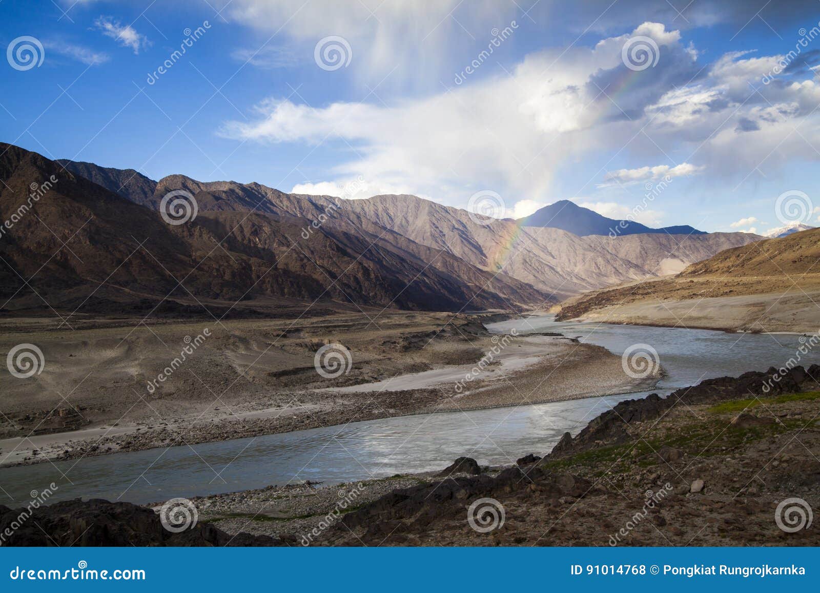 Rainbow scene in Pakistan stock photo. Image of hill - 91014768