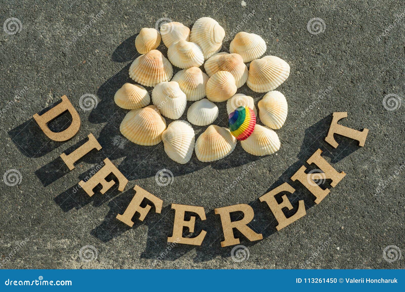 The Word `DIFFERENT` Is Laid Out On A Table Of Wooden Letters, Next To ...