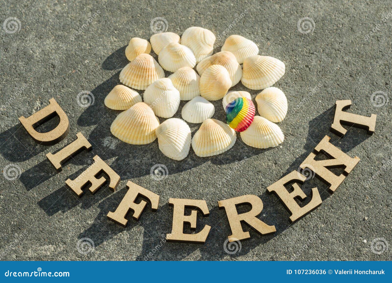 The Word `DIFFERENT` Is Laid Out On A Table Of Wooden Letters, Next To ...