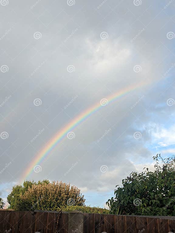 Rainbow in the Sky with Grey Clouds Stock Image - Image of dusk, storm ...