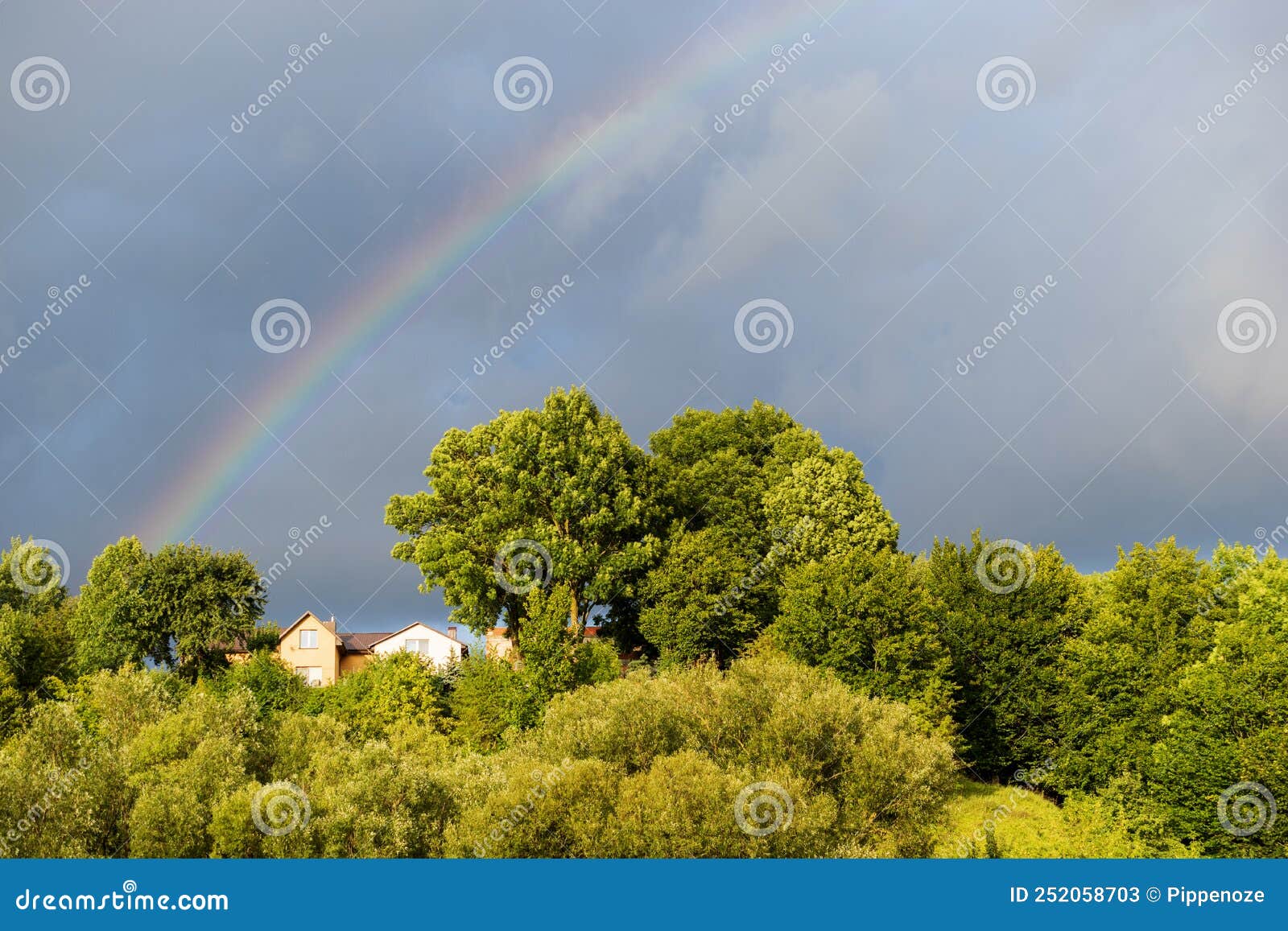 Rainbow in the Sky Over the House on Hill in Nature Stock Image - Image ...