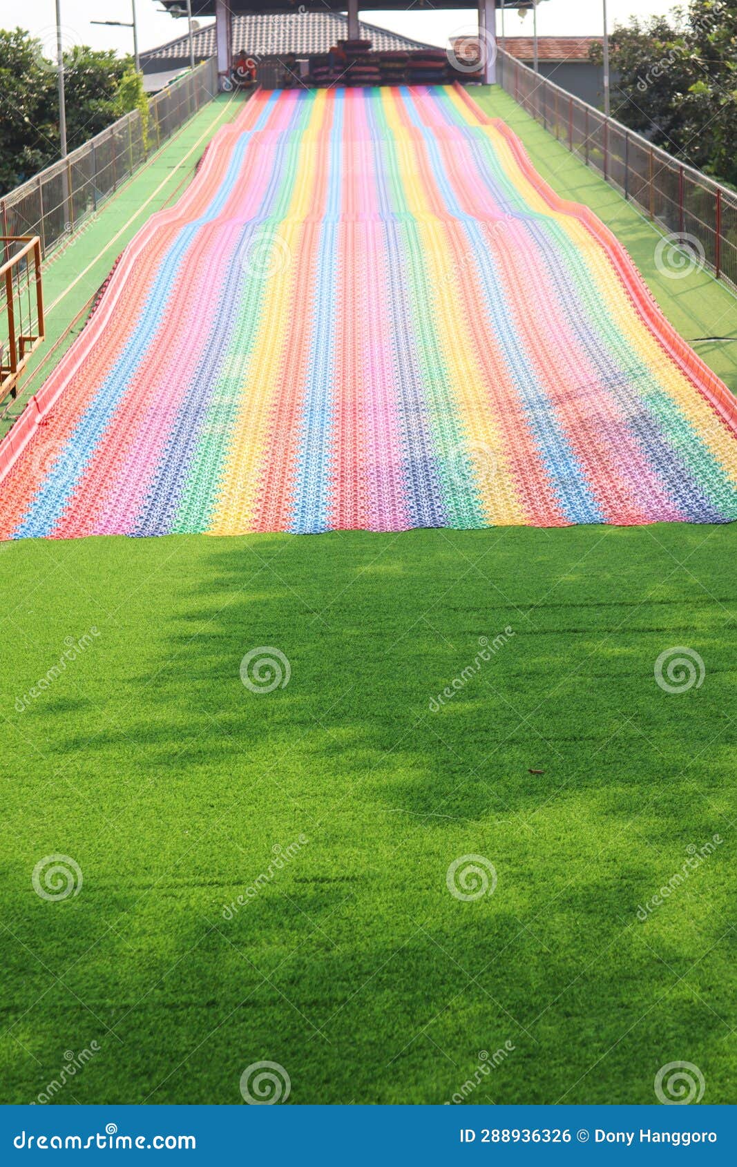 Playing Rainbow slide stock photo. Image of entertainment - 288936326