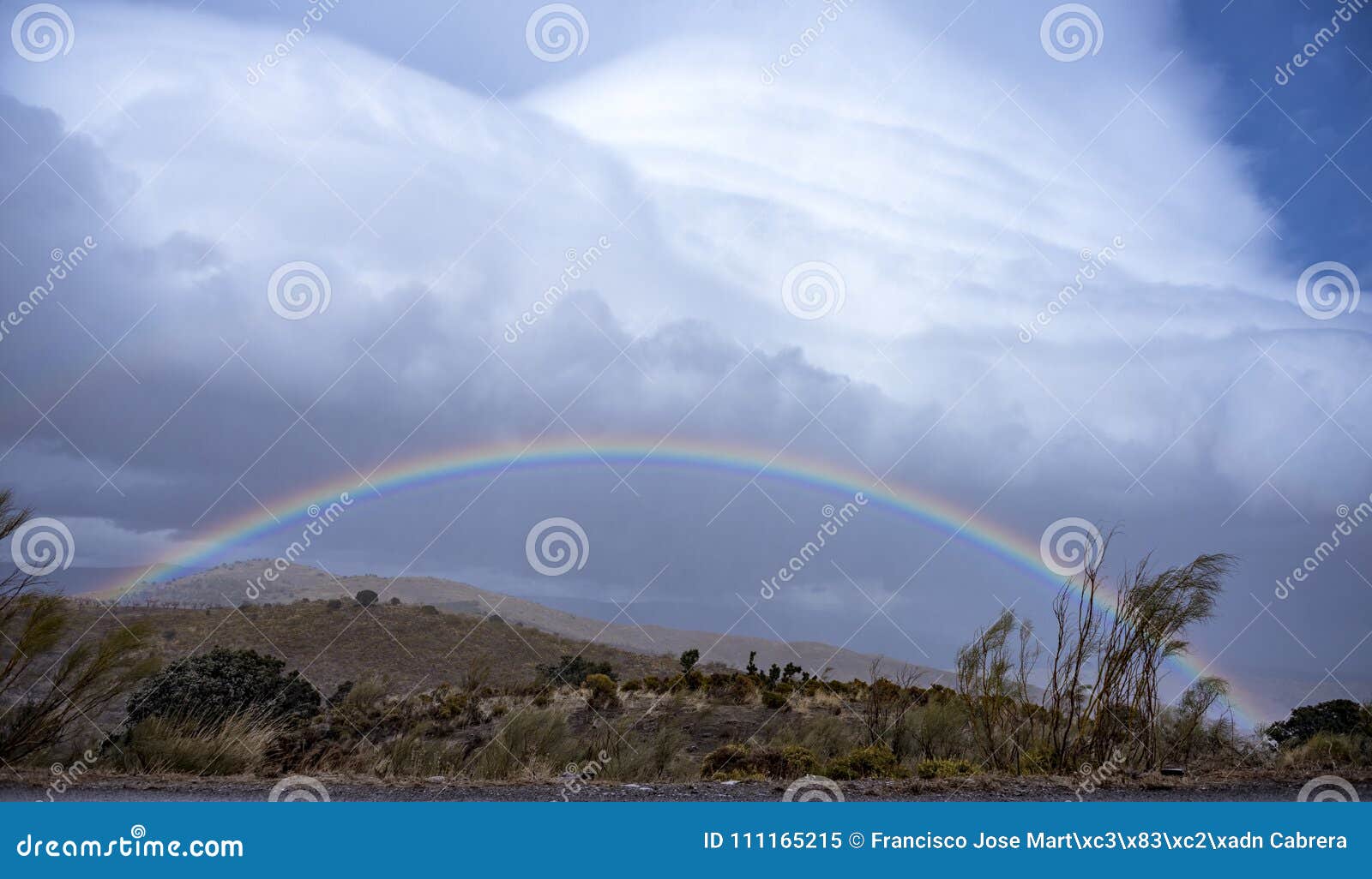Rainbow: Sometimes in the Middle of Something Beautiful Stock Image ...