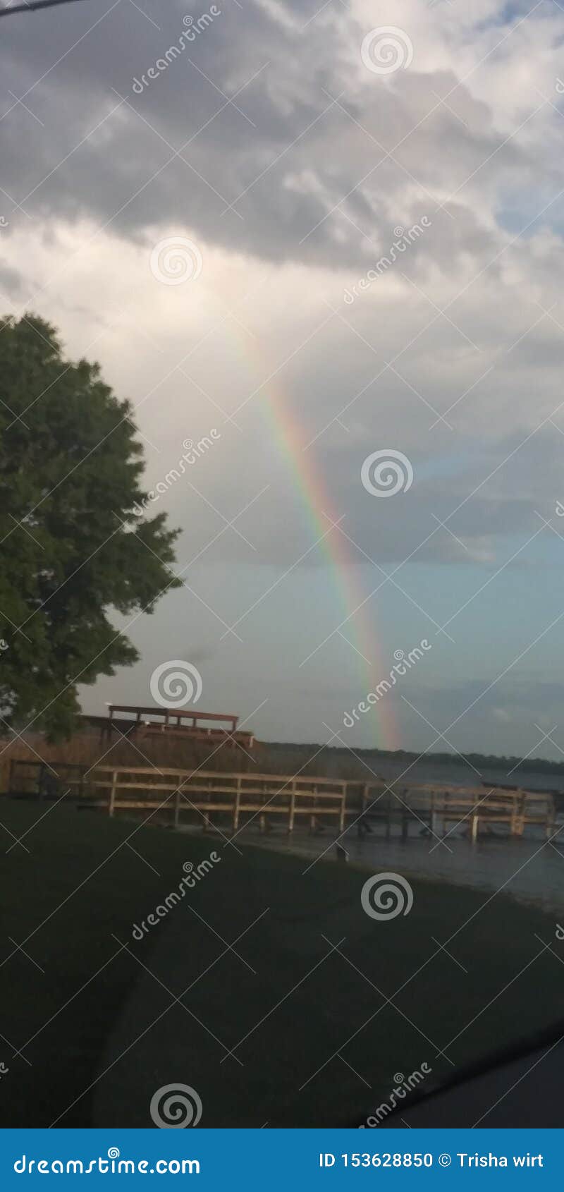 Rainbow Touching the Ground Stock Photo - Image of rainbow, ground ...