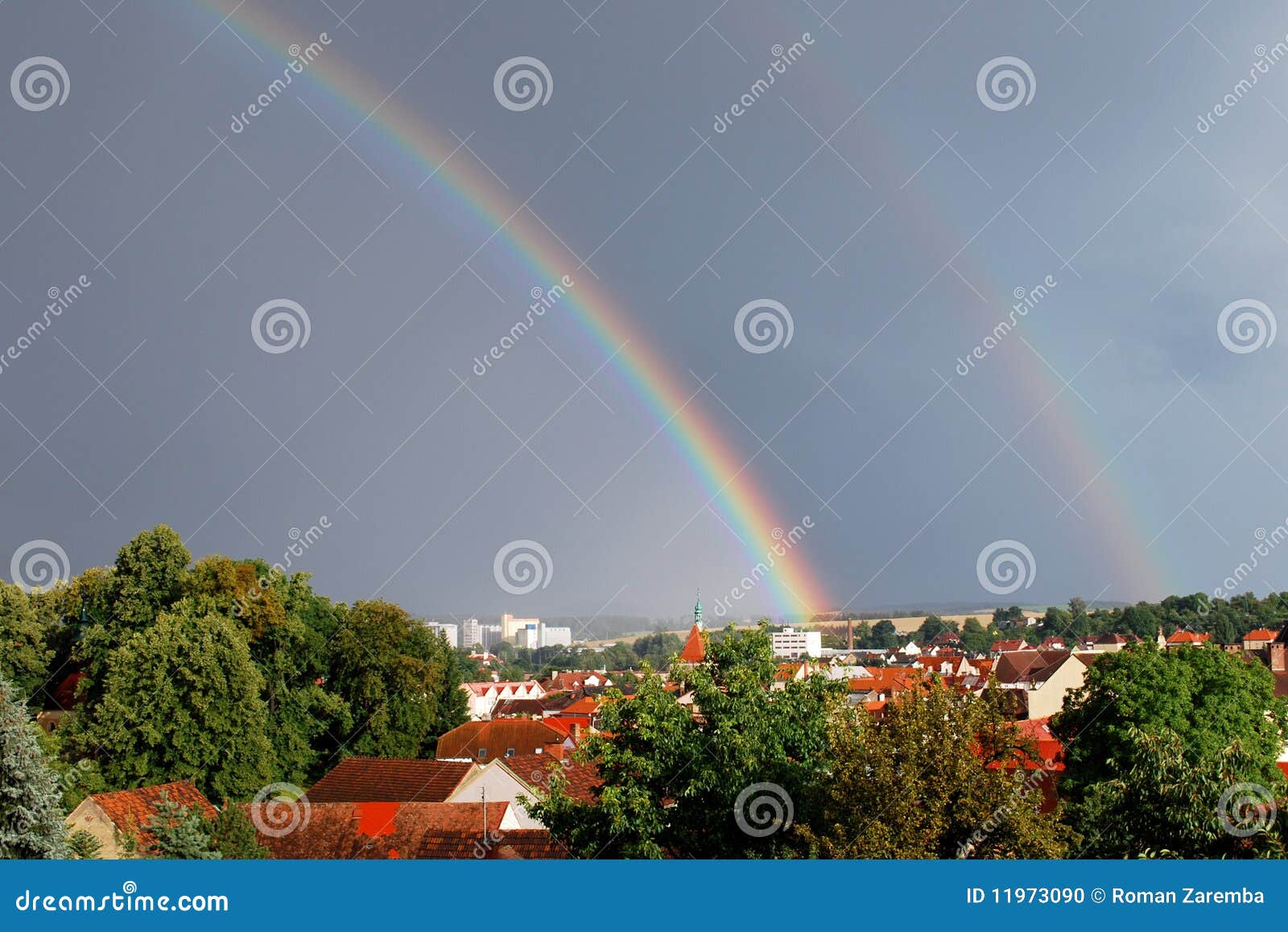 Rainbow in a town stock photo. Image of cloudy, house - 11973090