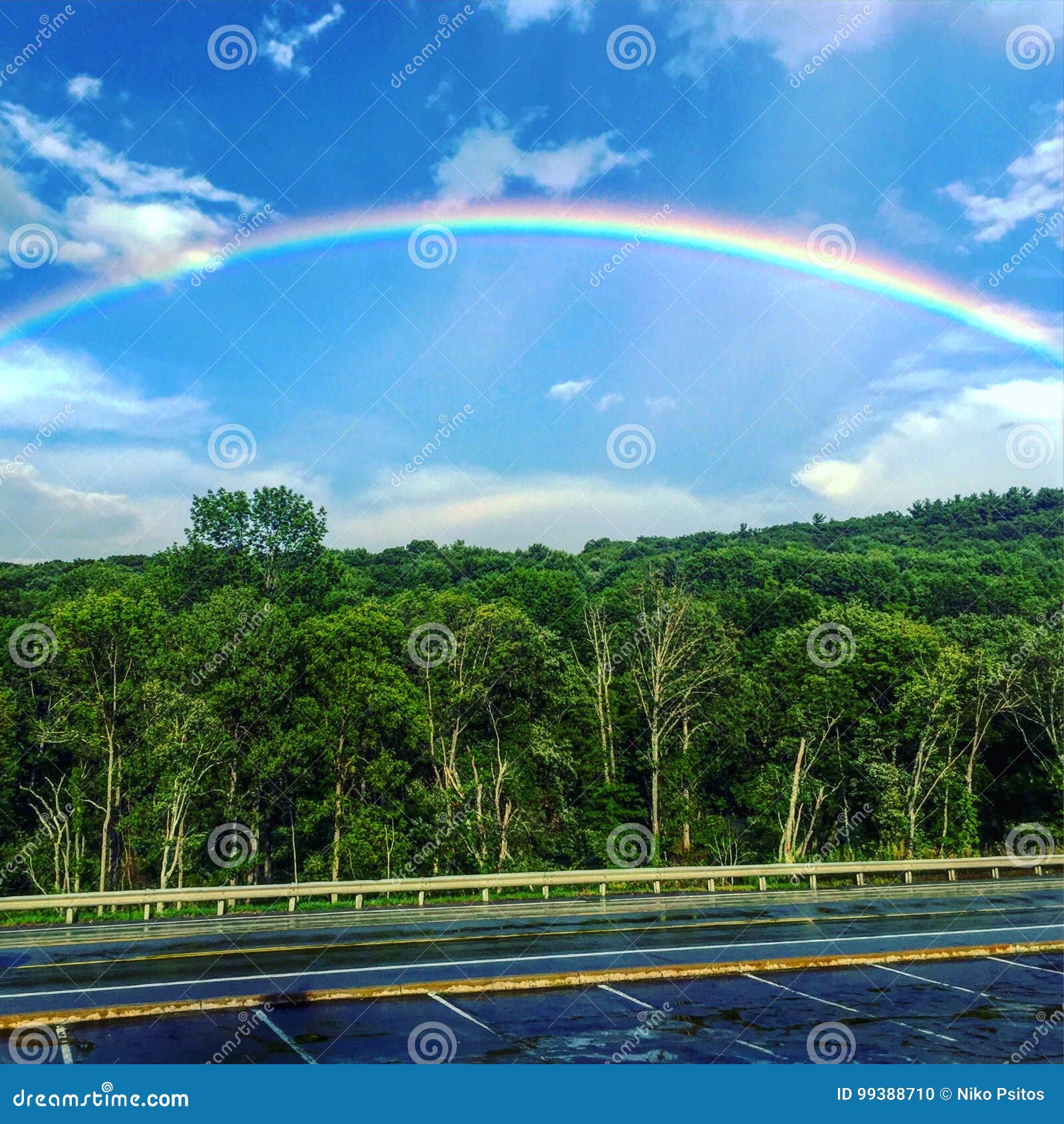Rainbow stock photo. Image of clouds, beautiful, trees - 99388710