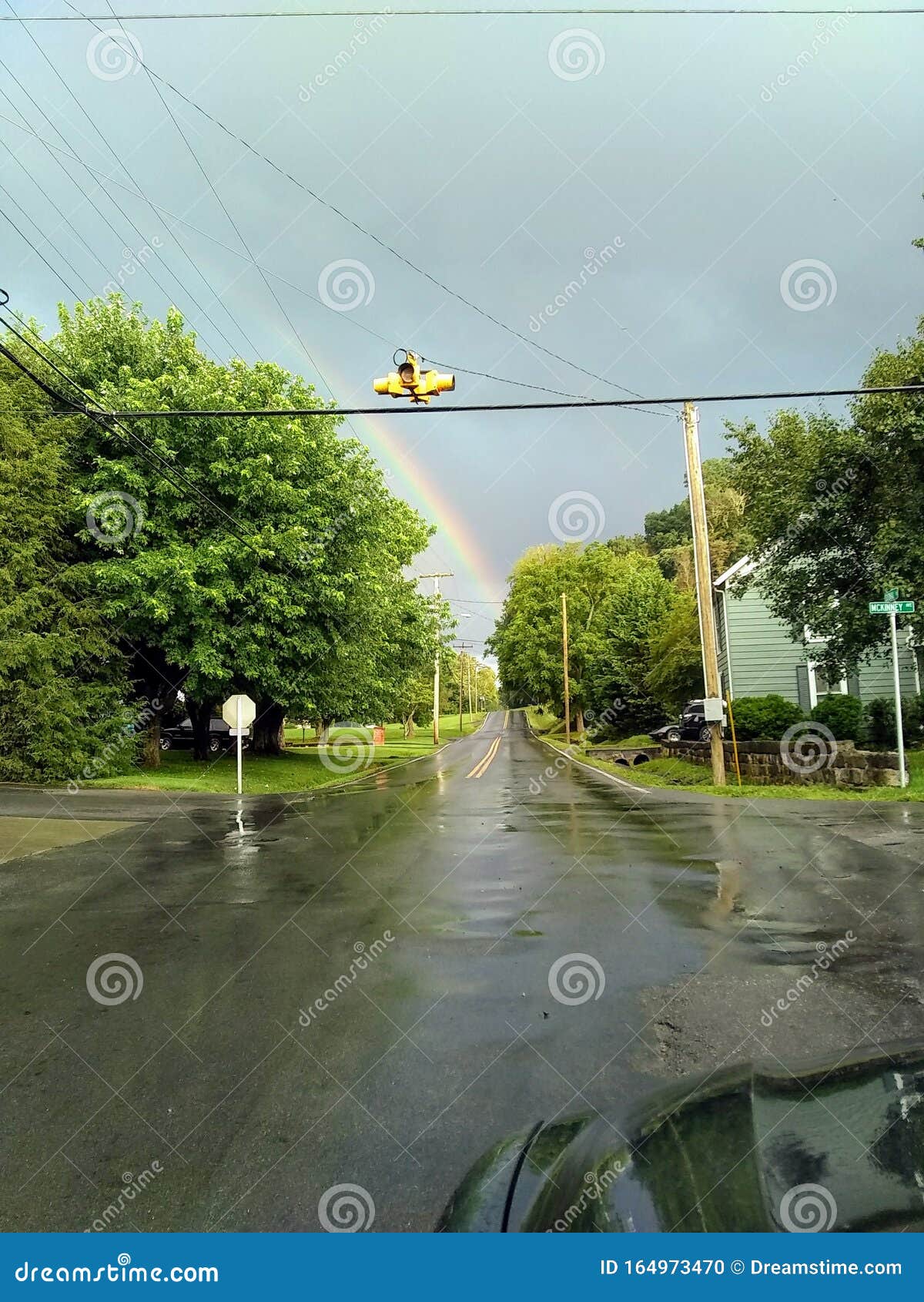 Rainbow at 4-way stop sign stock photo. Image of 4way - 164973470