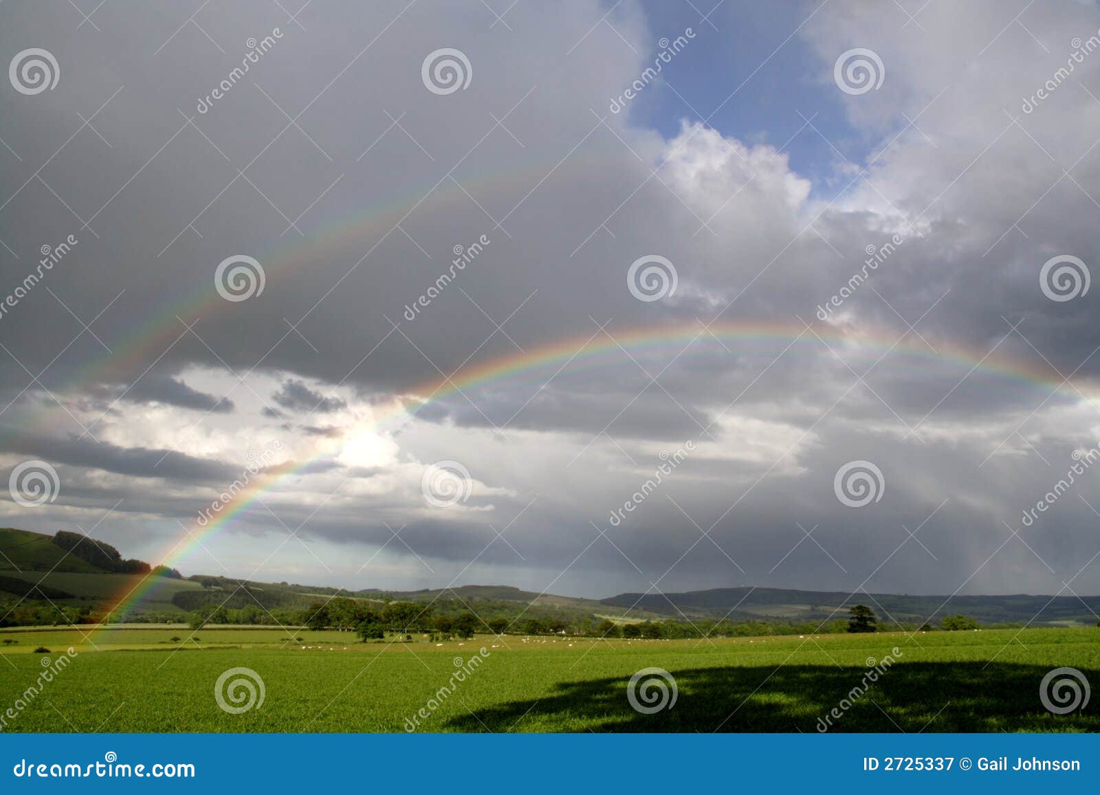 Rainbows and rain clouds stock image. Image of clouds - 2725337