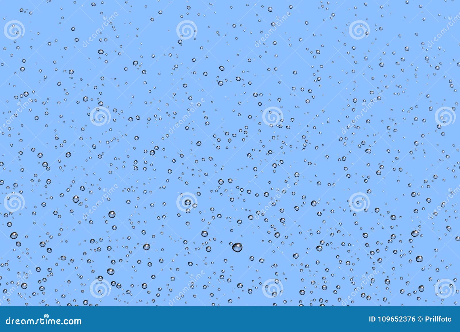 Raindrops in blue ambiance stock photo. Image of light - 109652376