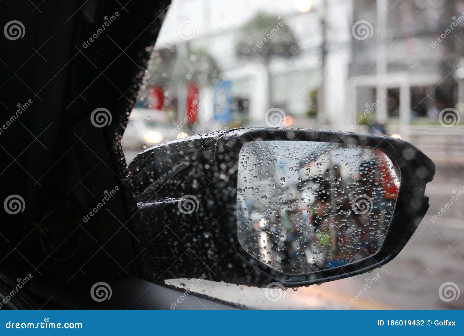 Raindrops on Car Rear View Mirror Outside Stock Photo - Image of blur ...