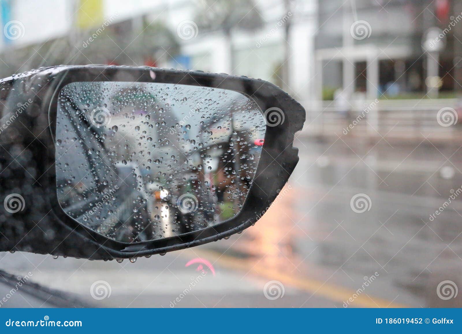 Raindrops on Car Rear View Mirror Outside Stock Photo - Image of black ...