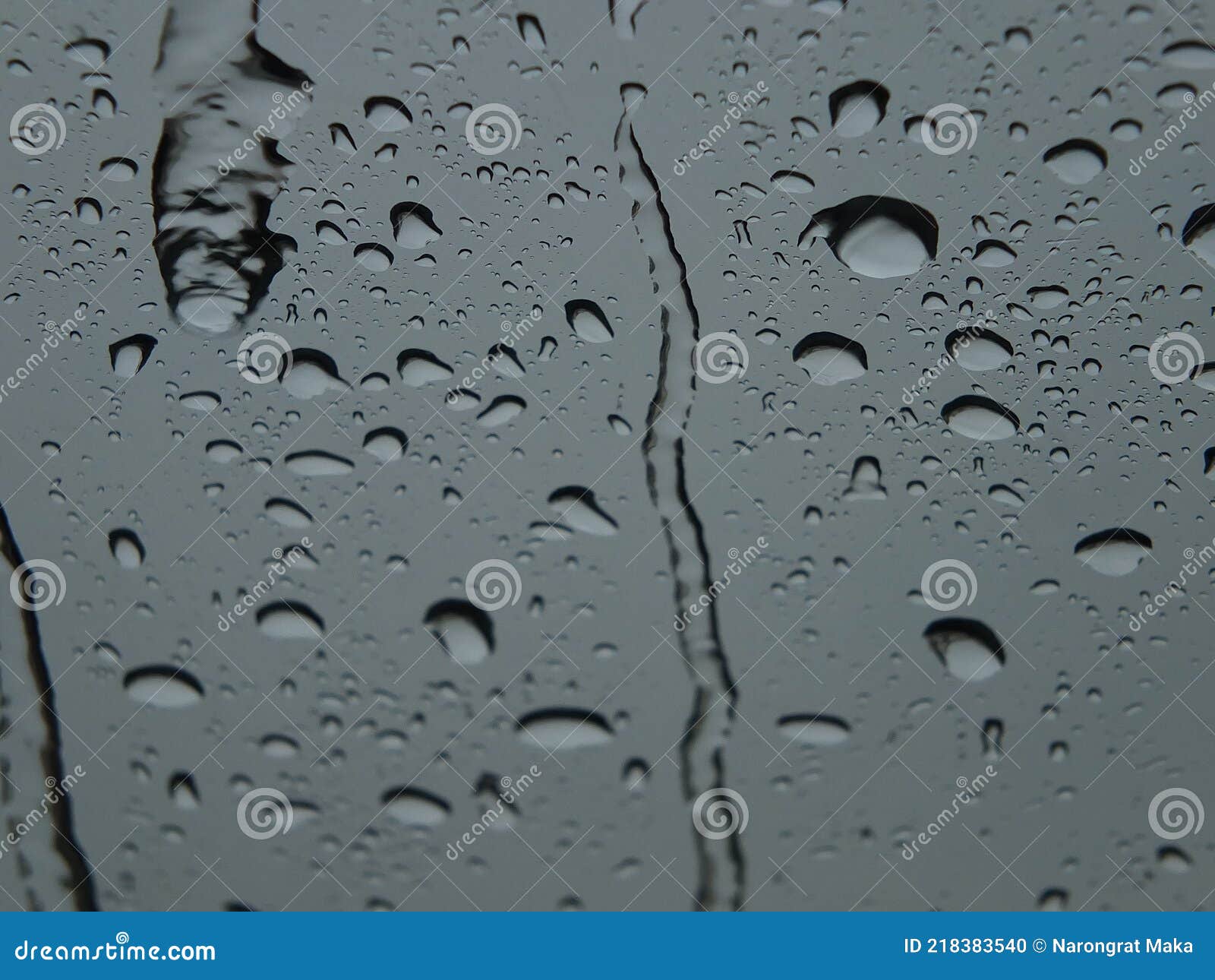 Rain drops on clear glass stock photo. Image of bright - 218383540