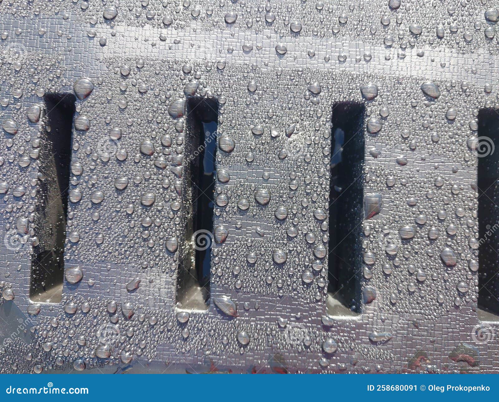 Raindrops Fell on Black Plastic Stock Image - Image of light, abstract ...