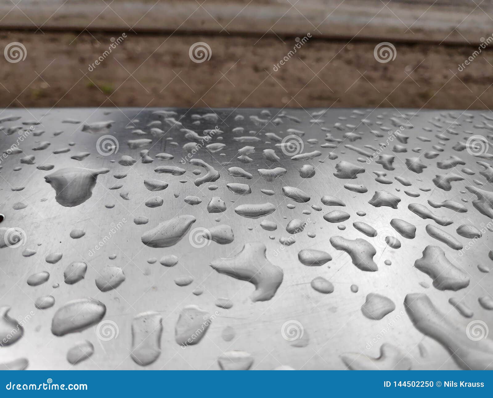 Raindrops Form Shapes on Metal Stock Photo - Image of liquid, aqua ...