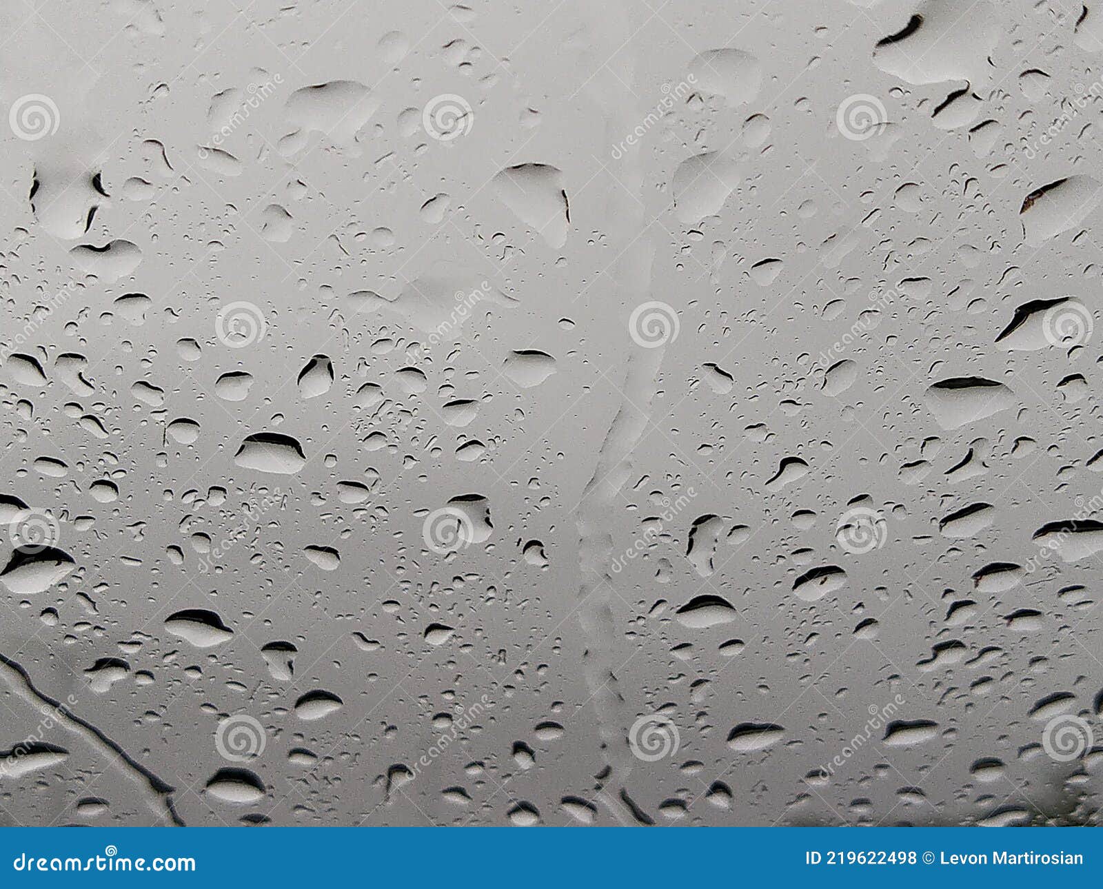 Raindrops on Glass on a Gray Background Stock Photo - Image of ...