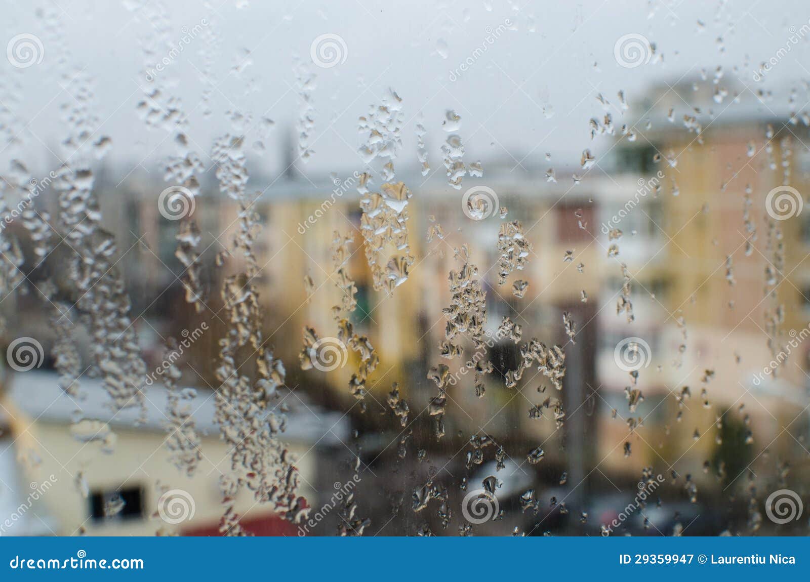 Raindrops on Glass Window with Buildings View Stock Image - Image of ...