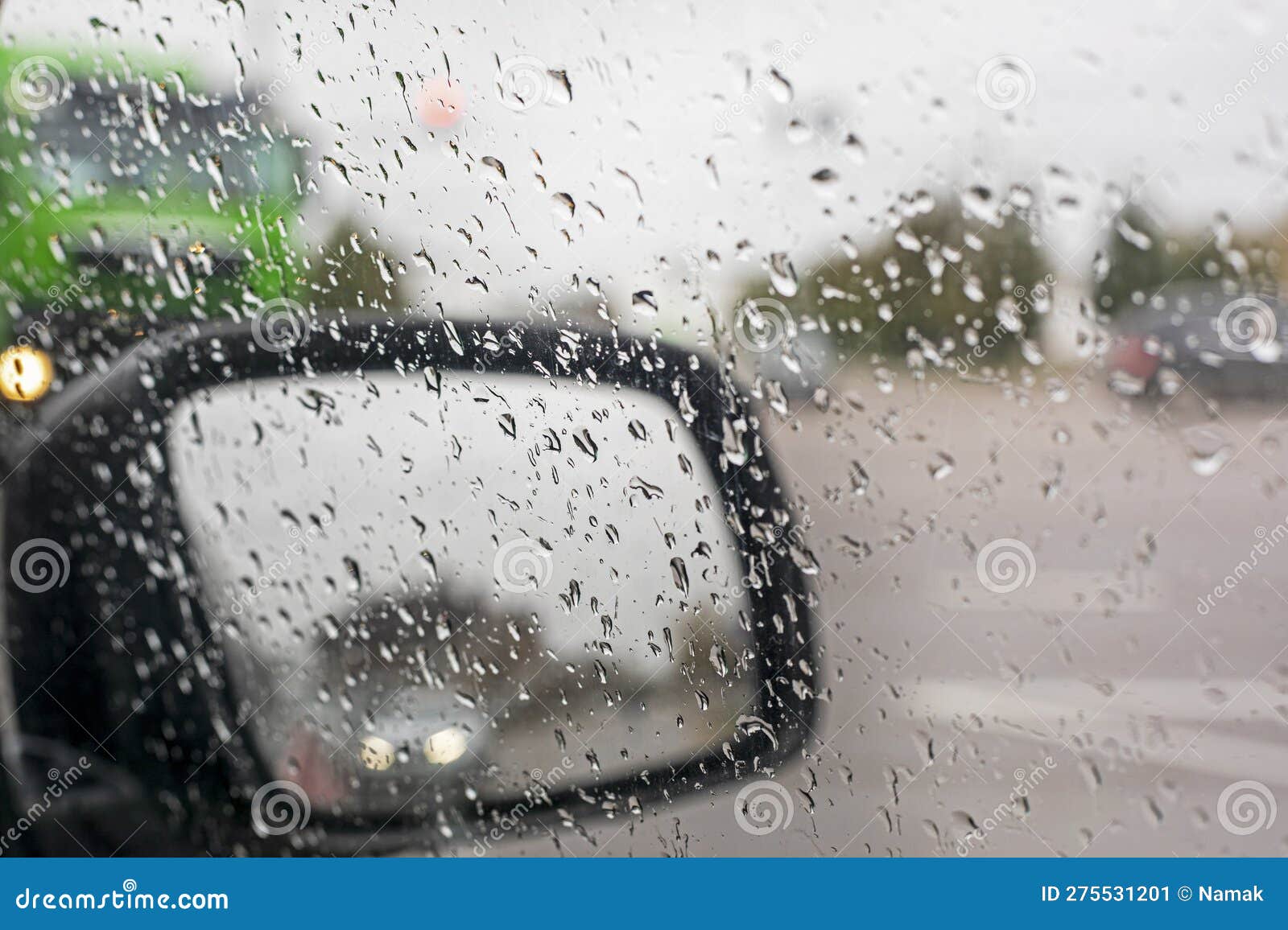 Raindrops on the Right Mirror of the Car, Poor Visibility on the Road ...