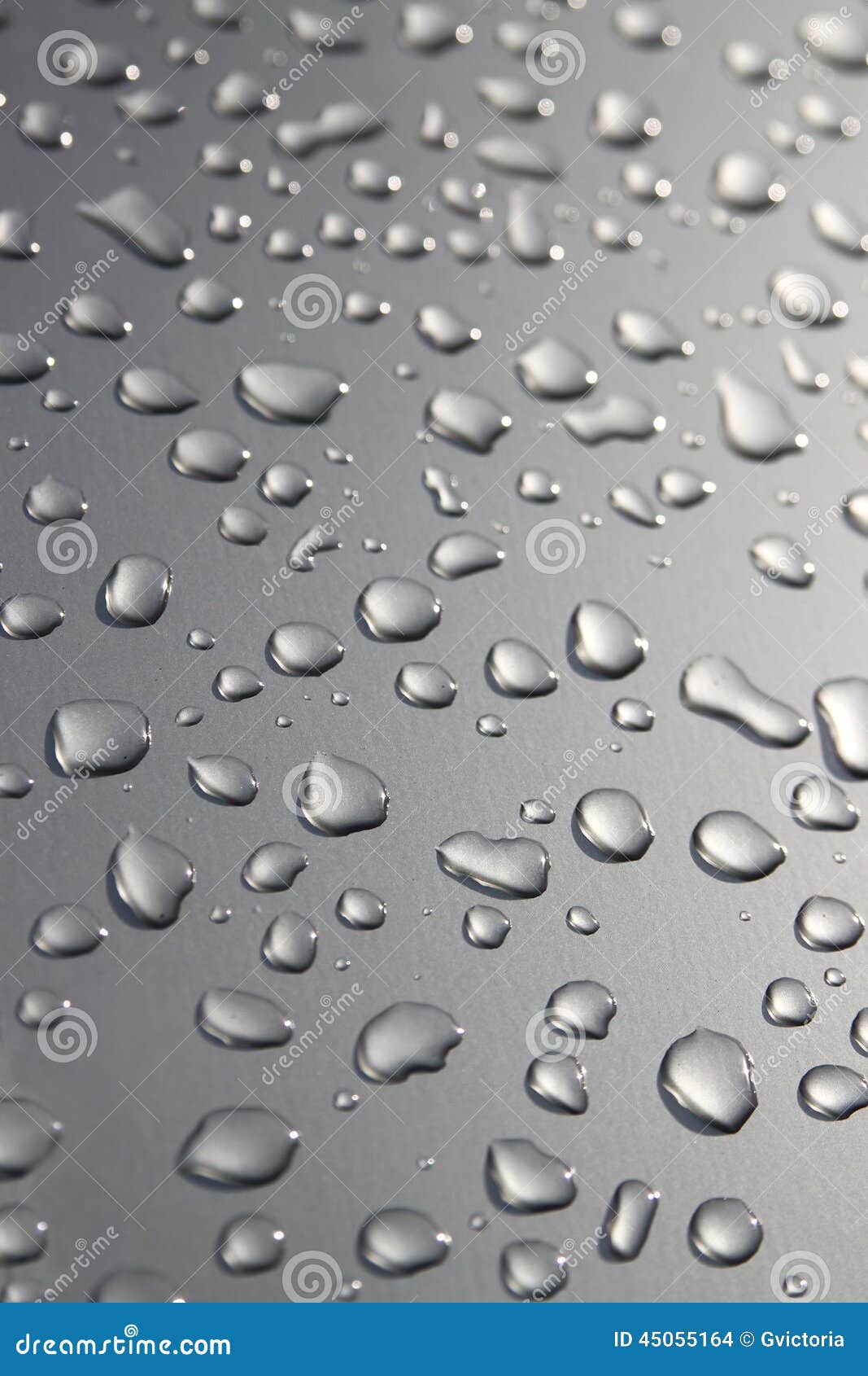 Raindrops on Silver Surface Stock Photo - Image of bright, drips: 45055164