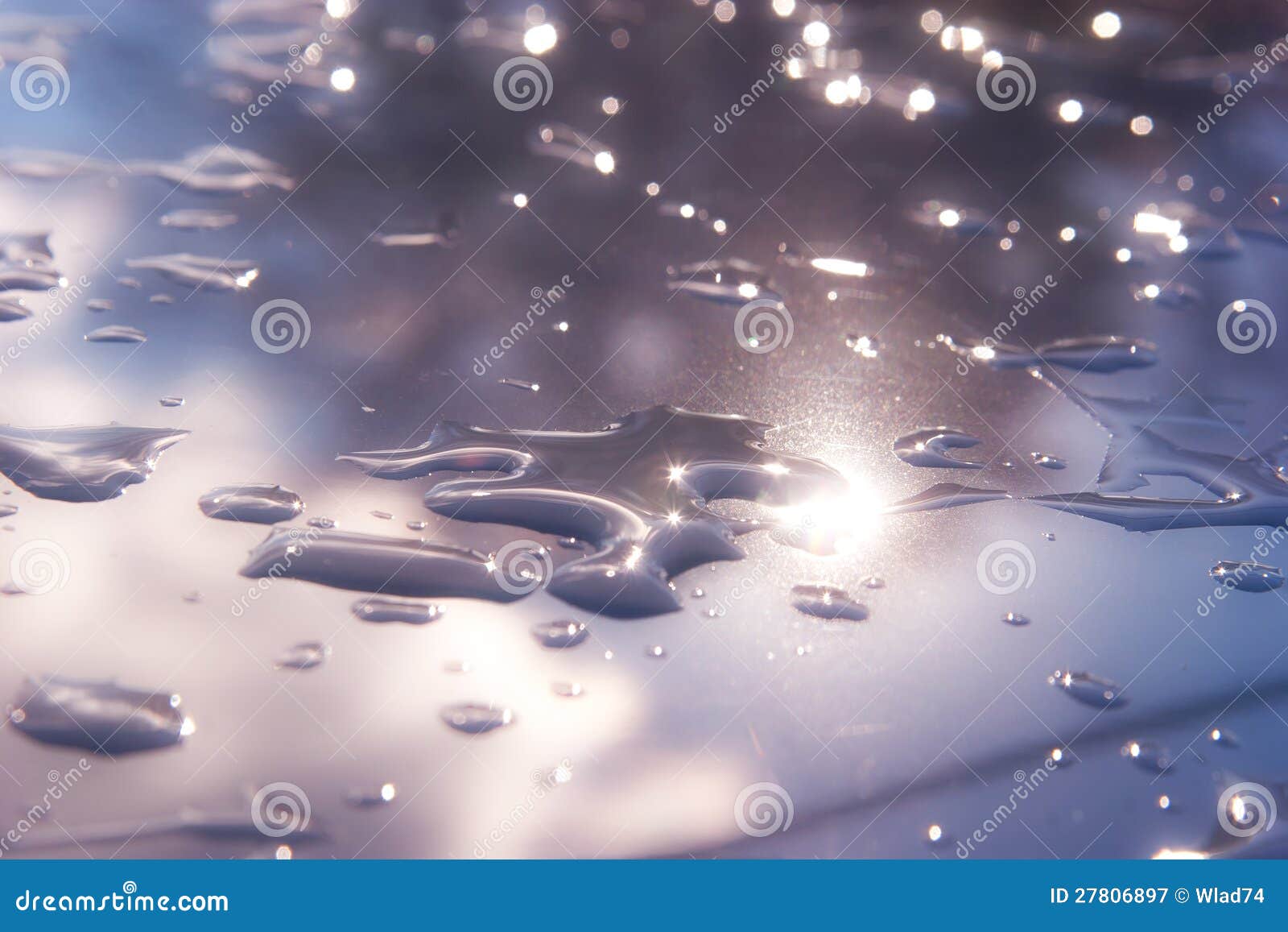 Raindrops, Sun Glare and Reflection of the Sky on Metal Surface Stock ...