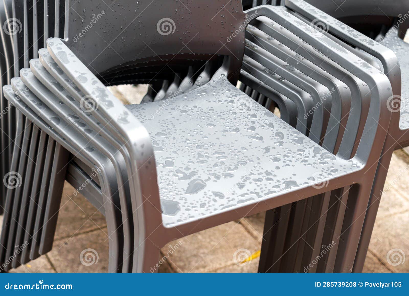 Raindrops on the Wet Surface of Gray Plastic Chairs Stock Photo - Image ...