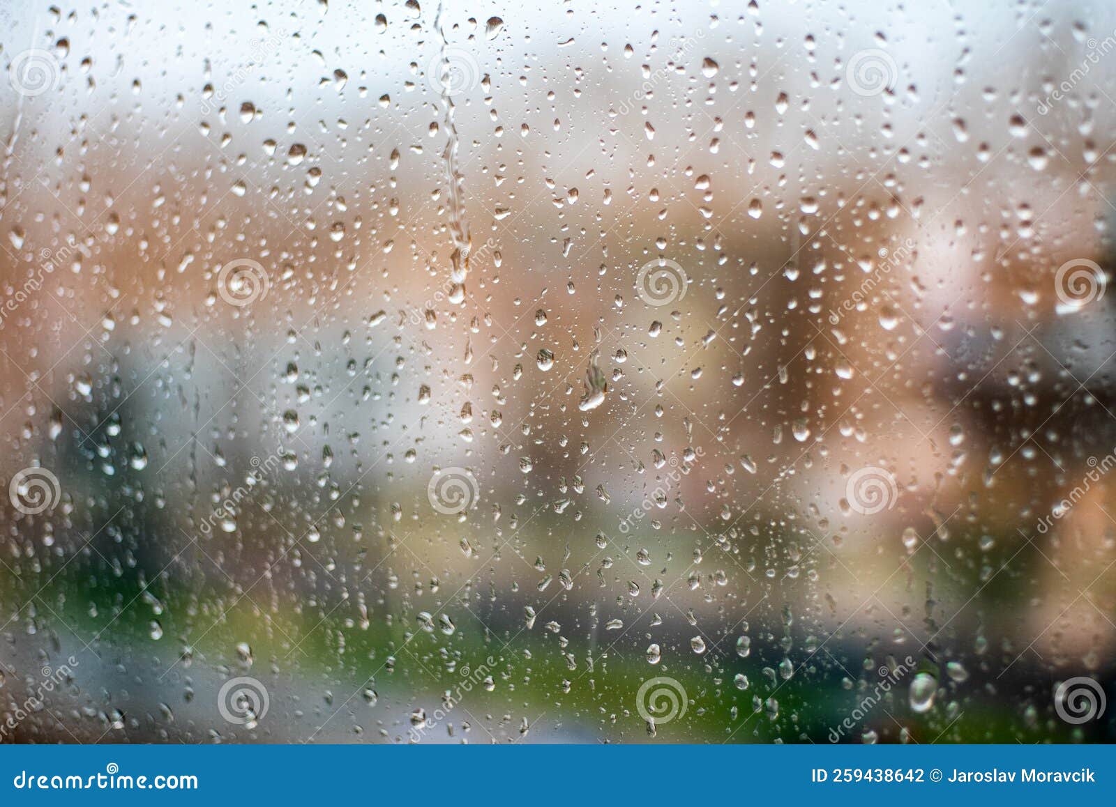 Raindrops on Window Glass. Rainy City Background Stock Photo - Image of ...