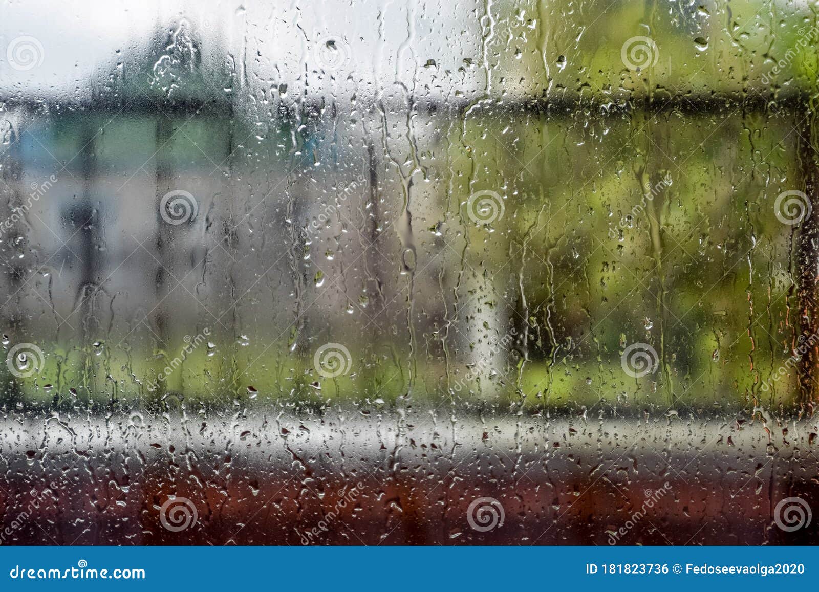 Raindrops on Window Pane. Blurred Background Outside the Window in the ...