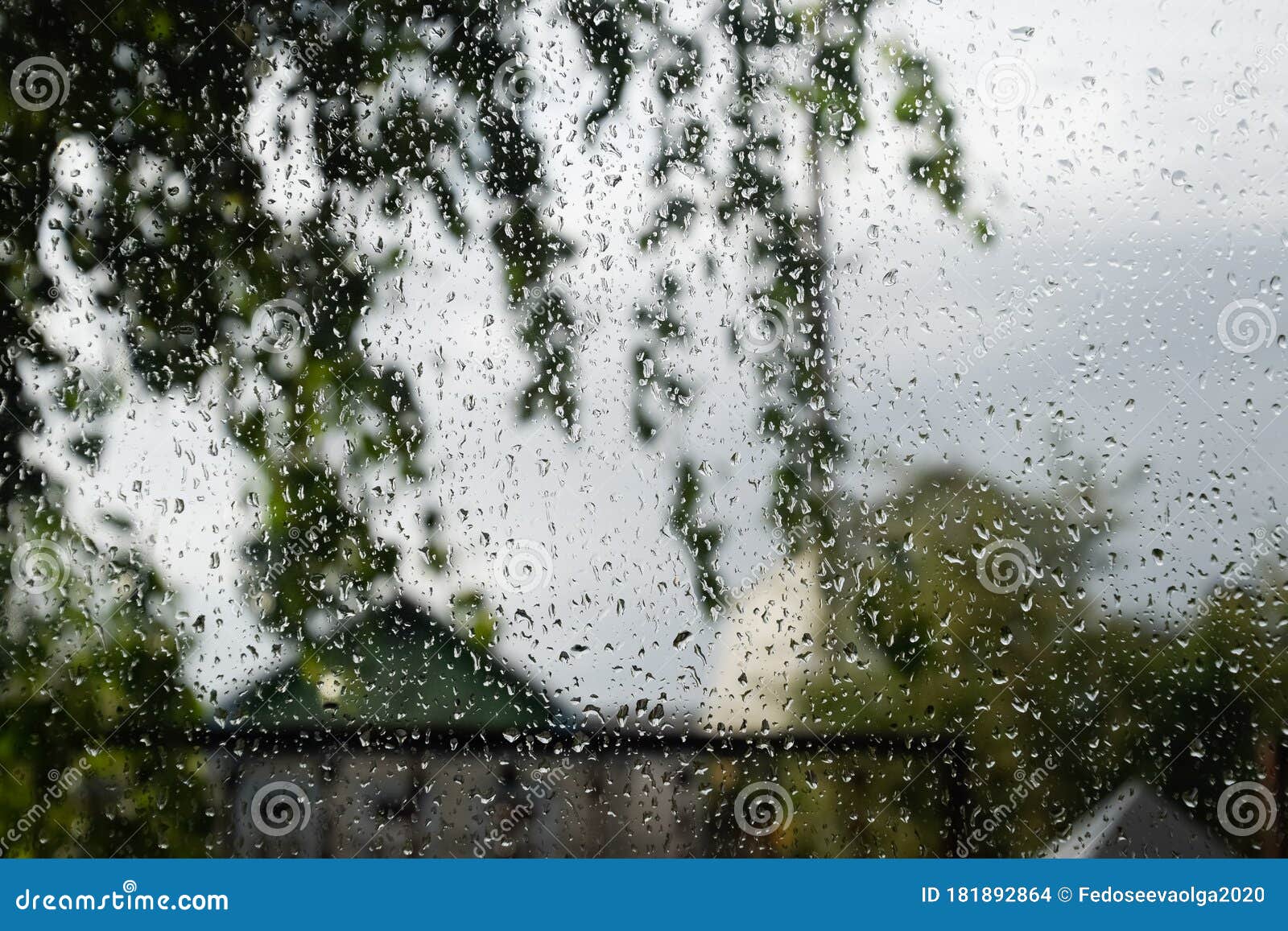 Raindrops on Window Pane. Blurred Background Outside the Window in the ...