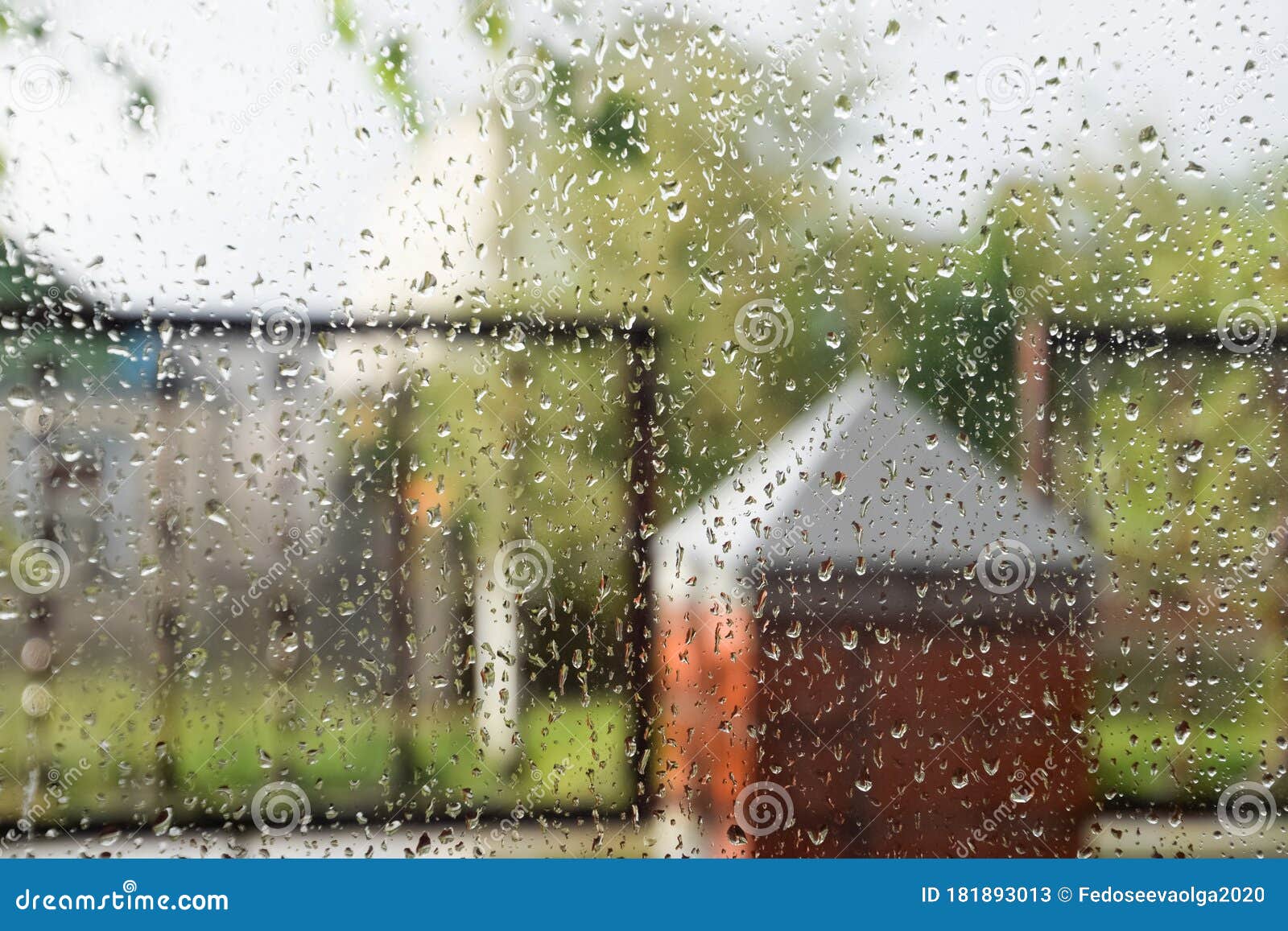 Raindrops on Window Pane. Blurred Background Outside the Window in the ...
